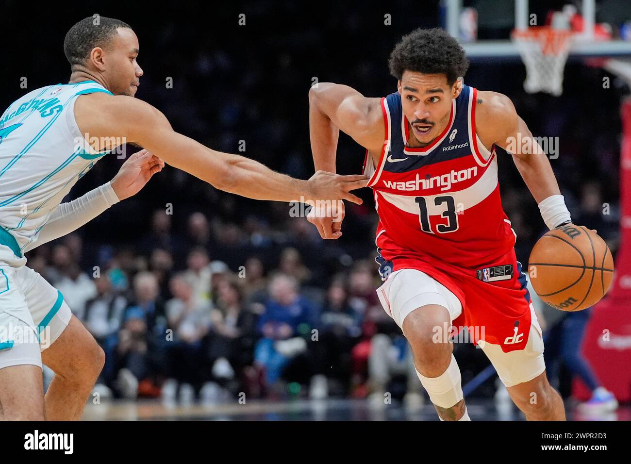 Washington Wizards guard Jordan Poole (13) drives past Charlotte ...