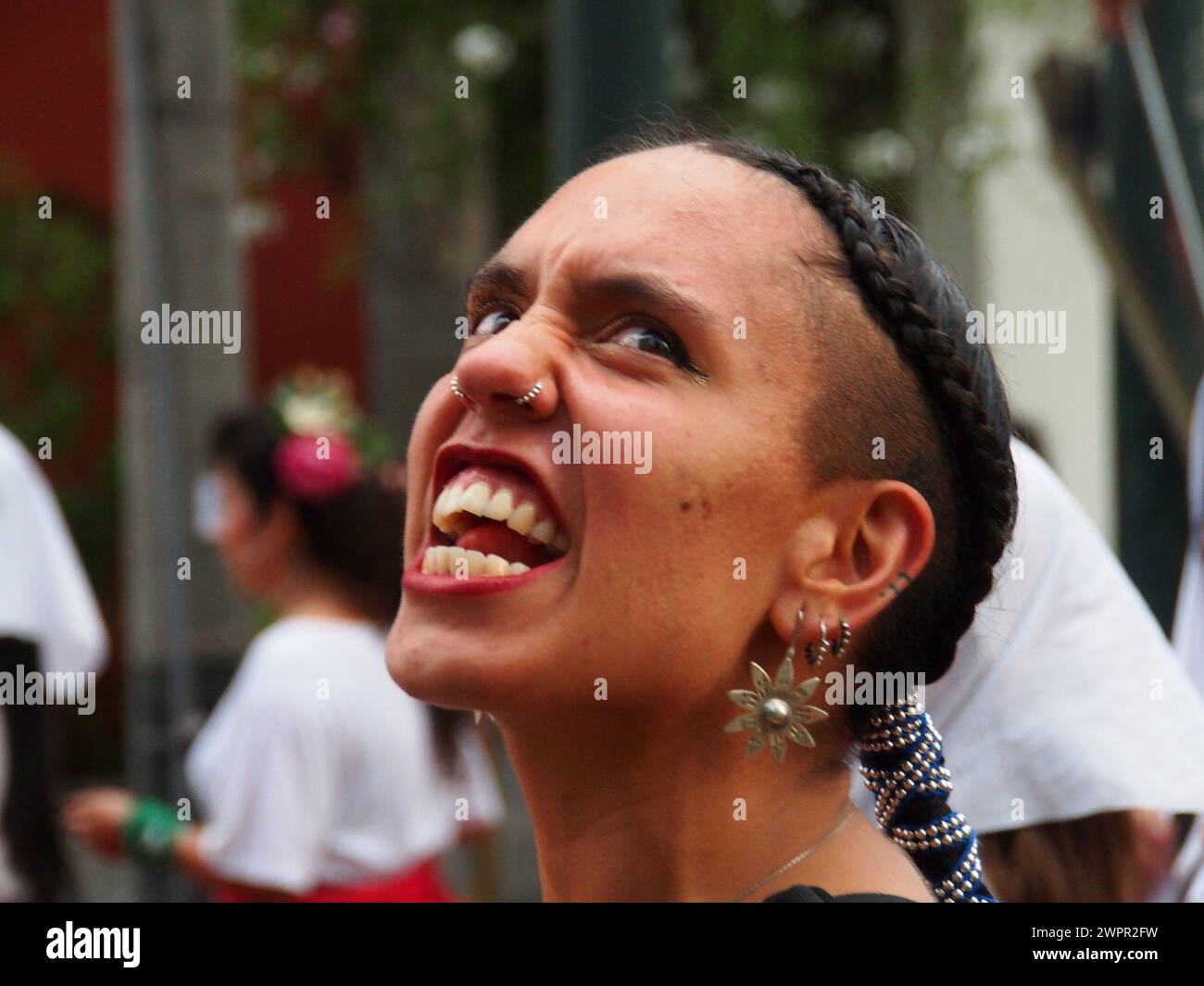 Lima, Peru. 08th Mar, 2024. Angry activist woman screaming when ...