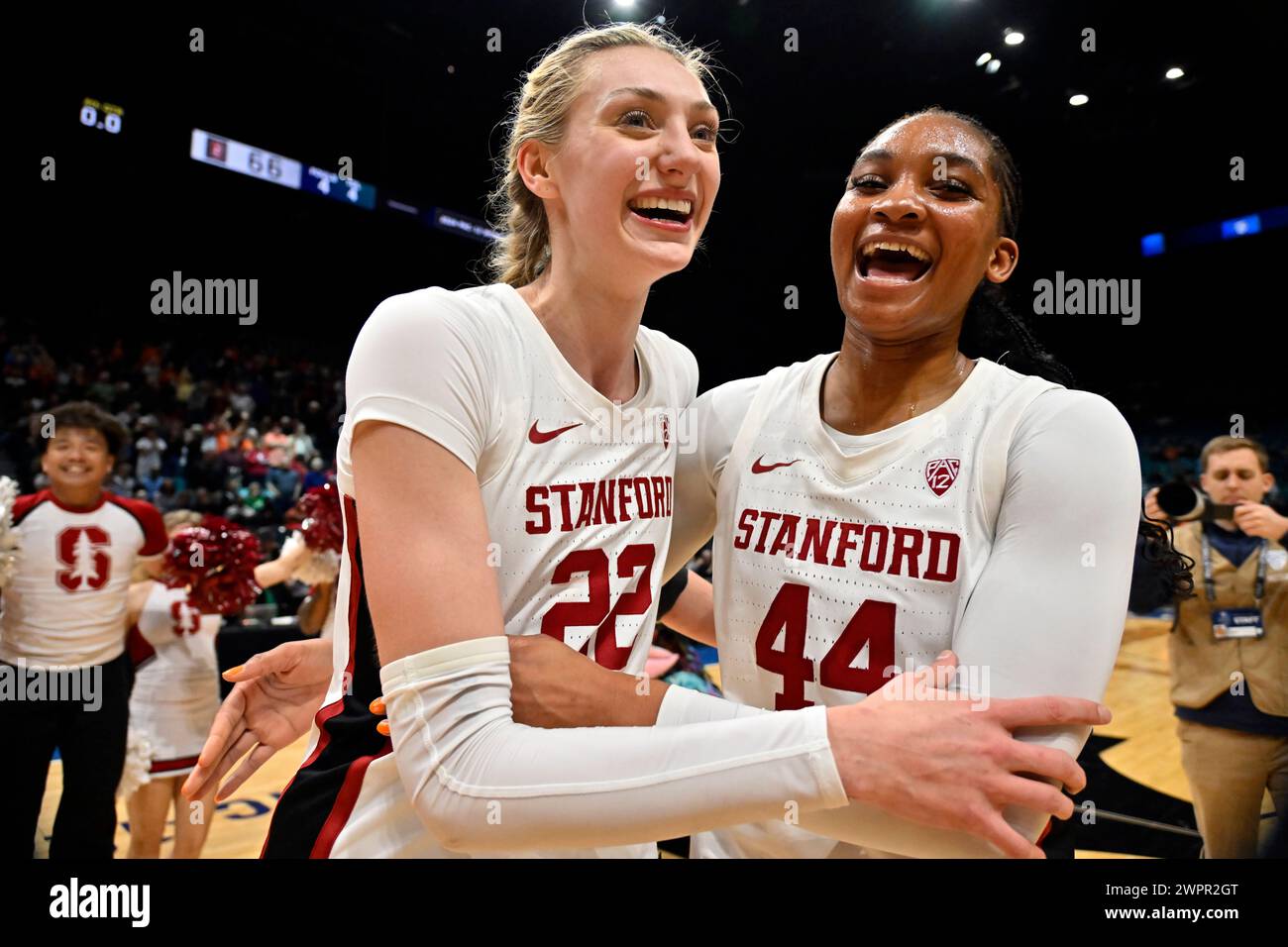 Stanford forward Cameron Brink (22) and forward Kiki Iriafen (44 ...