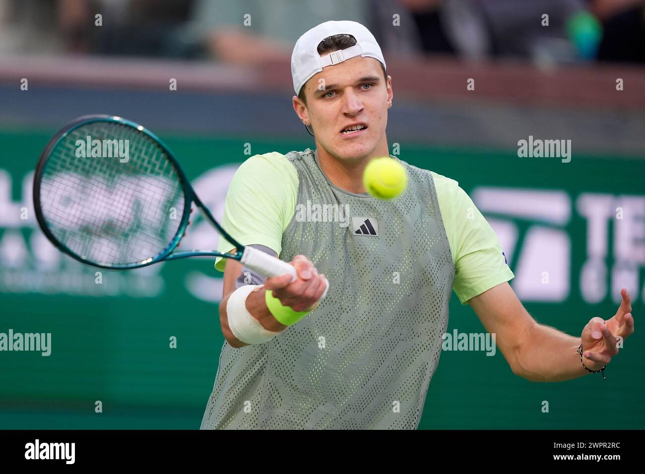 Jakub Mensik, of the Czech Republic, returns a shot against Ben Shelton ...