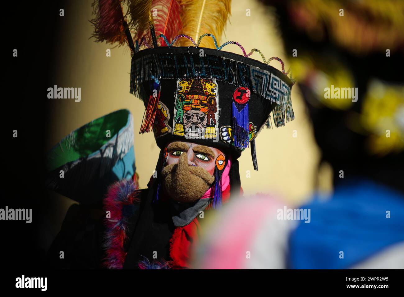 Mexico City, Mexico. 8th Mar, 2024. A person in costume participates in ...