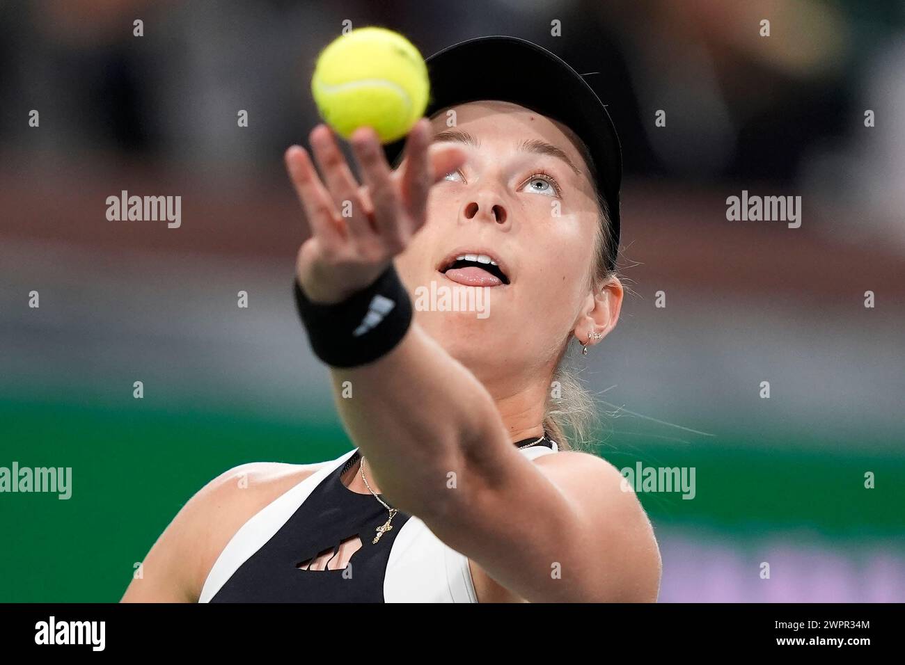 Katie Volynets, of the United States, serves against Ons Jabeur, of ...