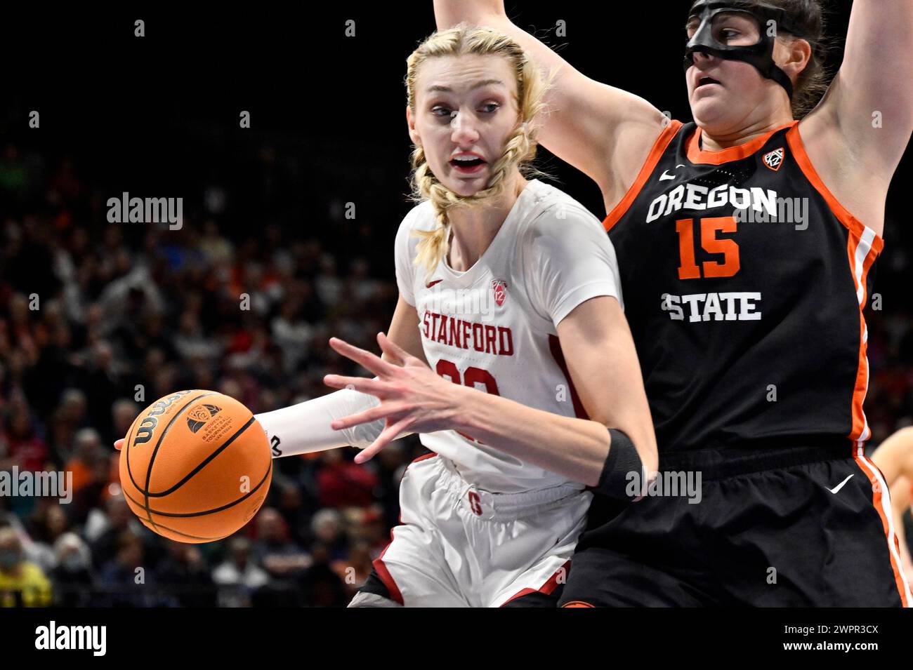 Stanford forward Cameron Brink, left, drives the ball against Oregon ...