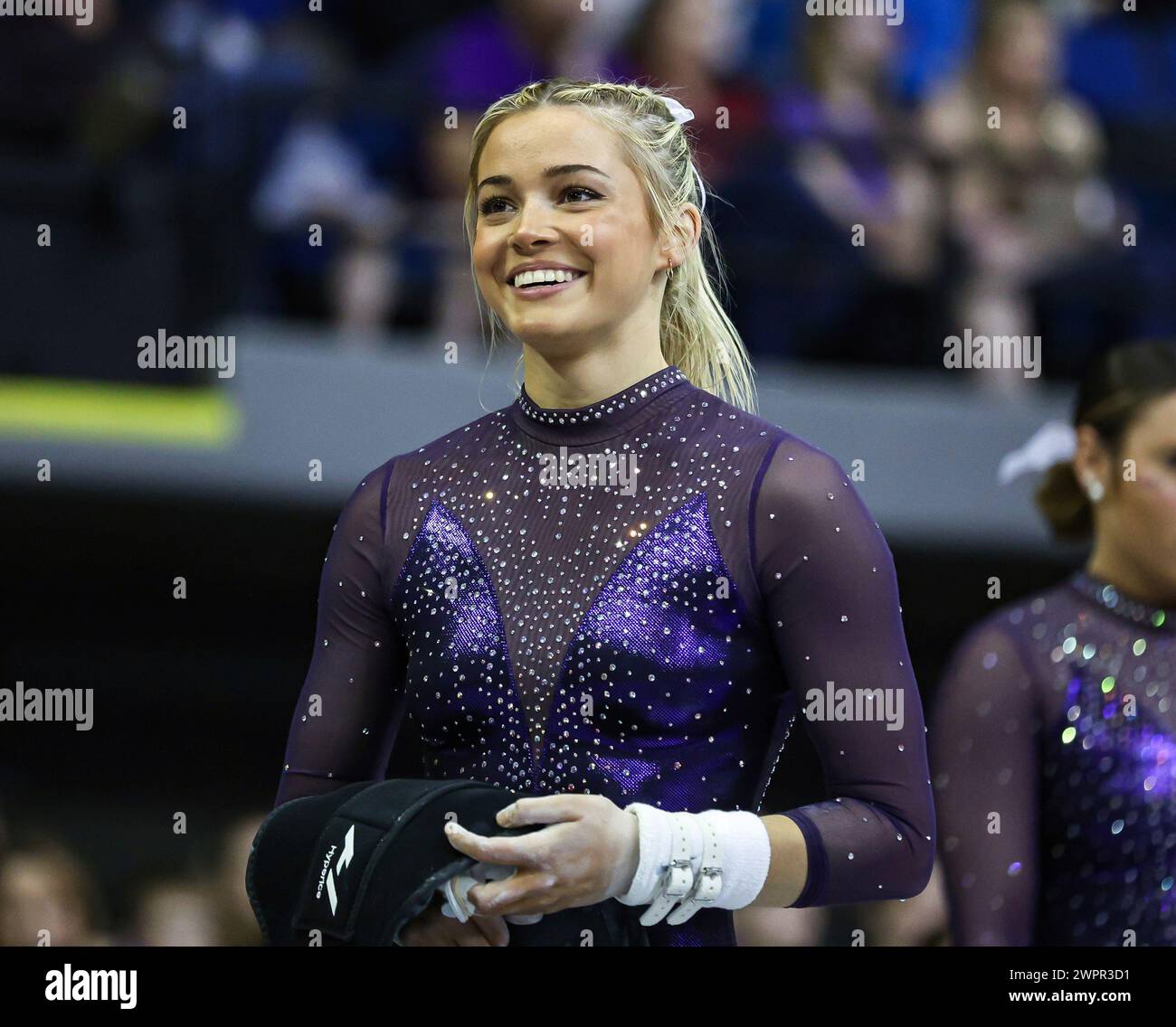 March 8, 2023: LSU's Olivia Dunne smiles during her team's bar rotation ...