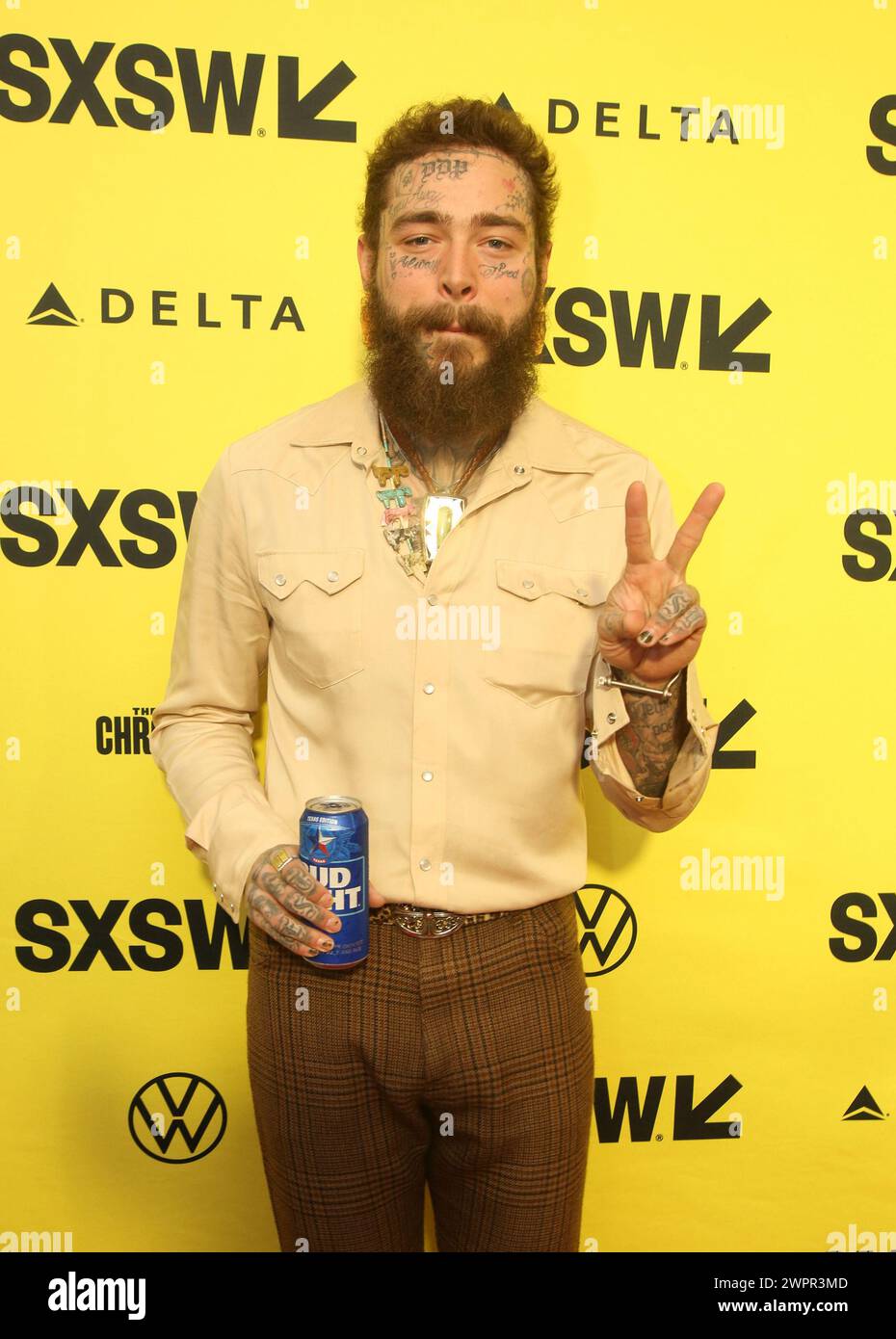 Post Malone arrives for the world premiere of "Road House" on the first ...