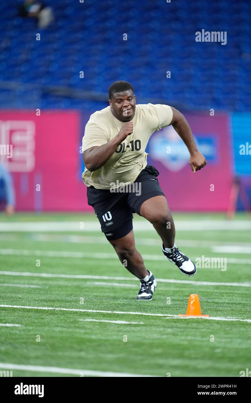 Miami offensive lineman Javion Cohen runs a drill at the NFL football scouting combine, Sunday ...
