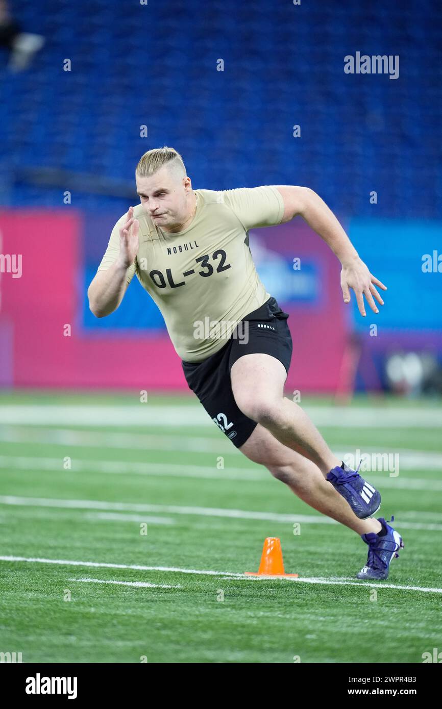 Holy Cross offensive lineman CJ Hanson runs a drill at the NFL football ...