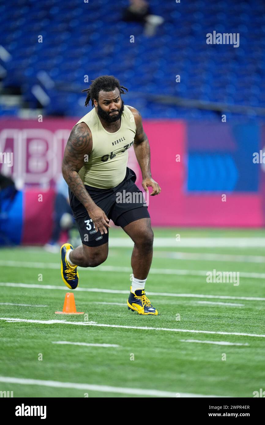 Michigan offensive lineman Trente Jones runs a drill at the NFL ...