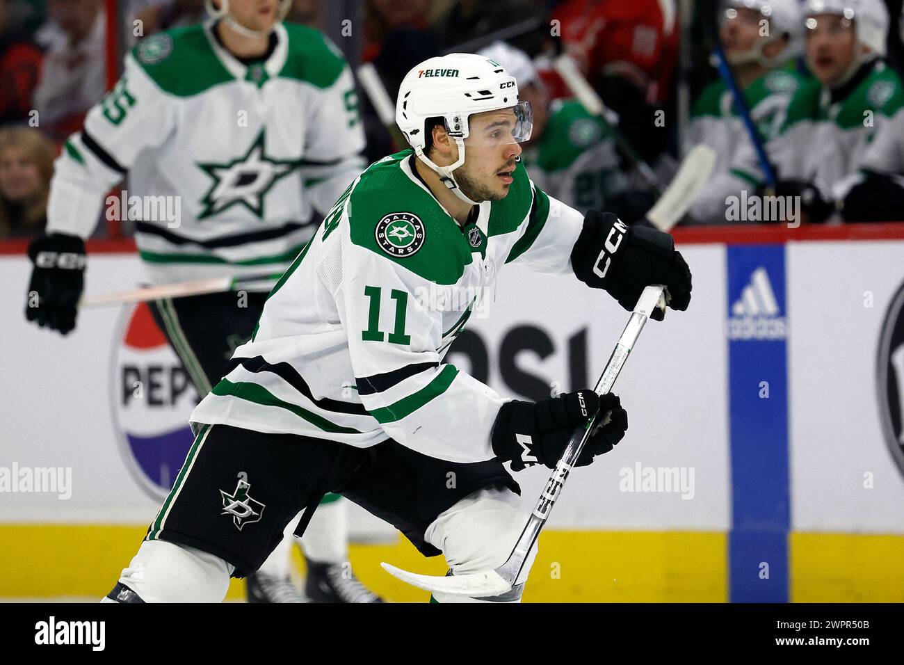 Dallas Stars' Logan Stankoven (11) skates toward the puck against the ...
