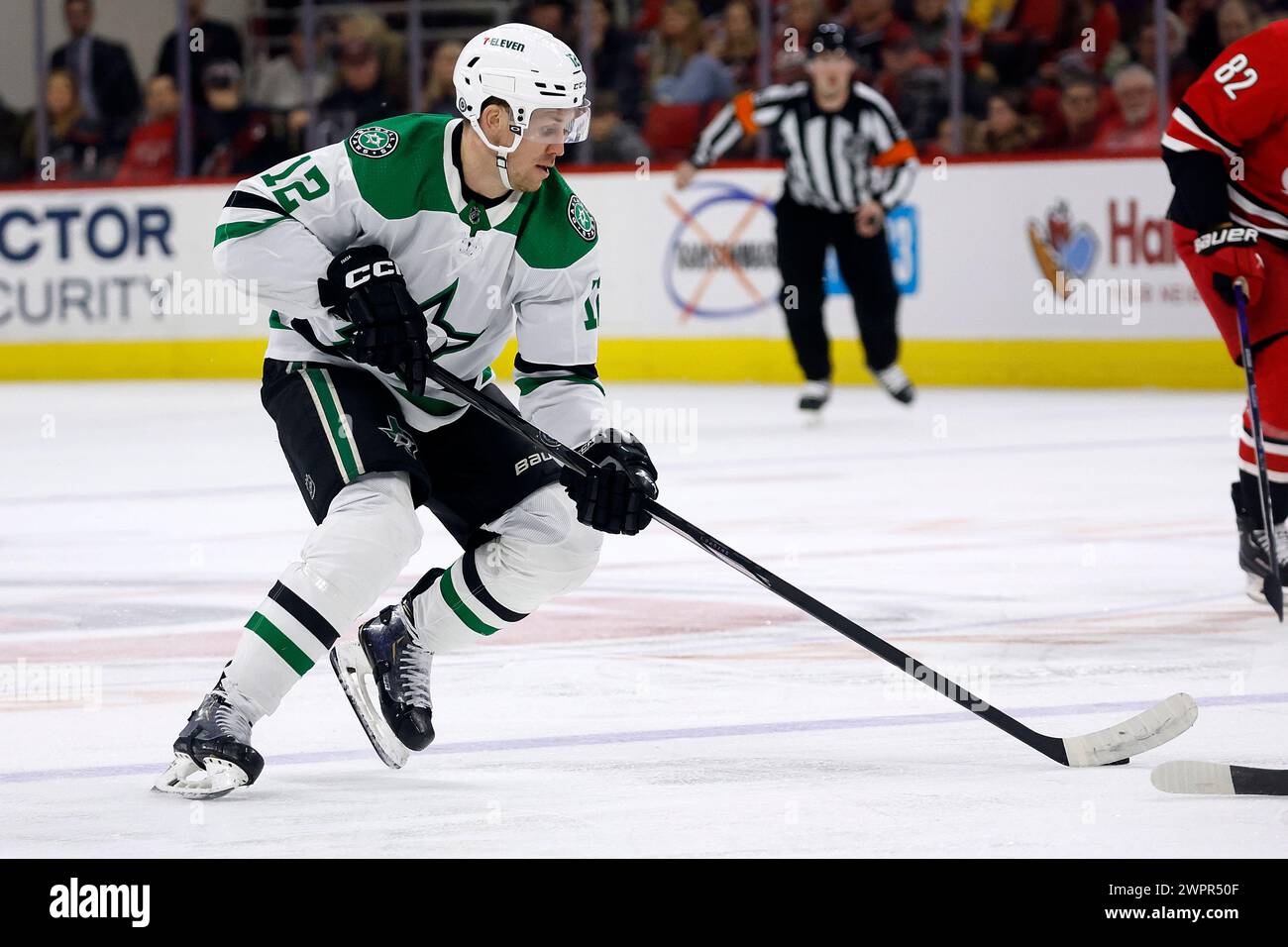 Dallas Stars' Radek Faksa (12) controls the puck against the Carolina ...