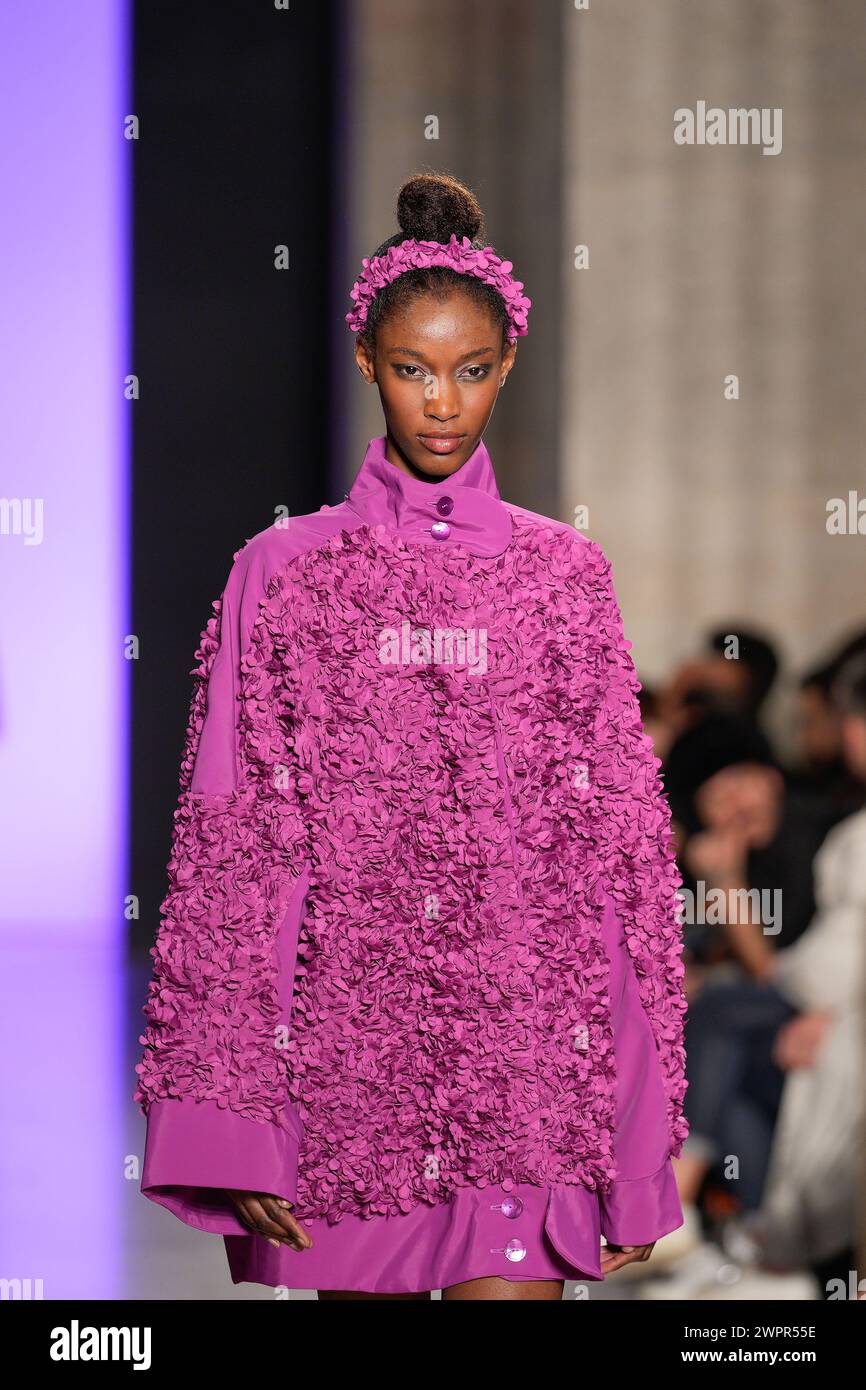 Lisbon, Portugal. 08th Mar, 2024. A model walks the runway during Luis ...