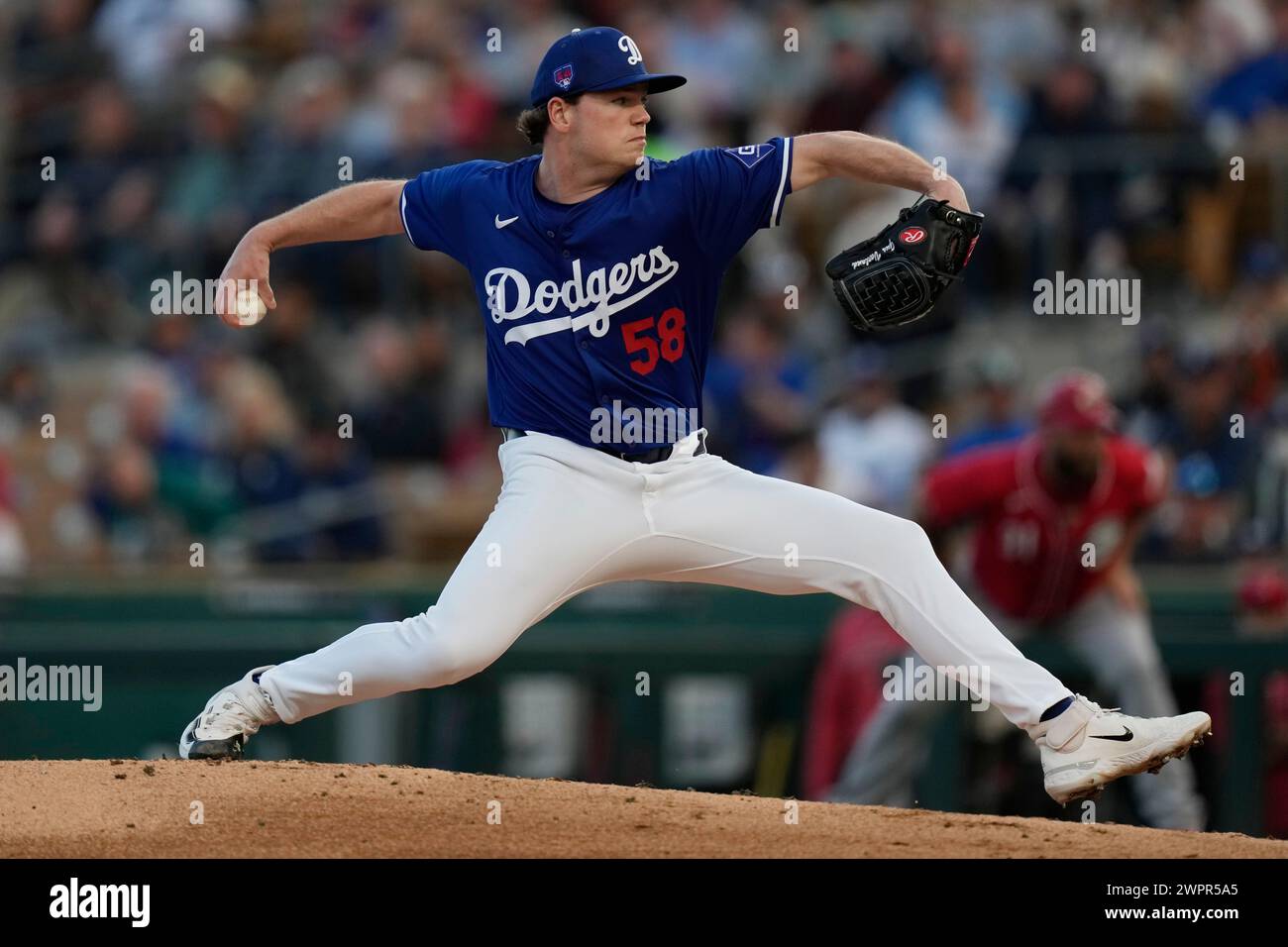Los Angeles Dodgers relief pitcher Gus Varland throws in the second ...