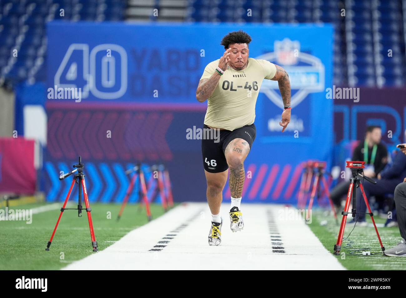 Boston College offensive lineman Christian Mahogany runs a drill at the ...
