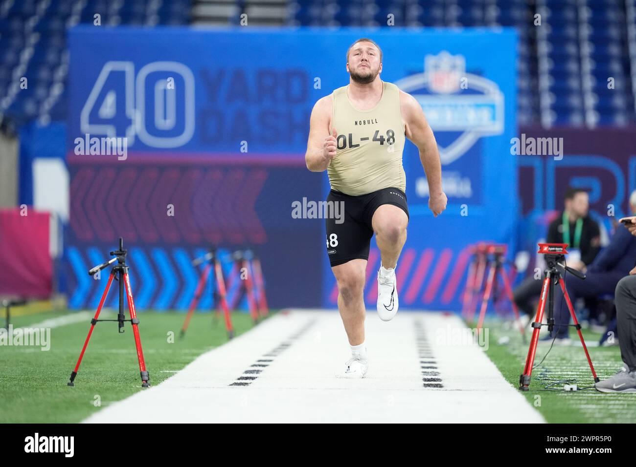 South Dakota State offensive lineman Mason McCormick runs a drill at ...