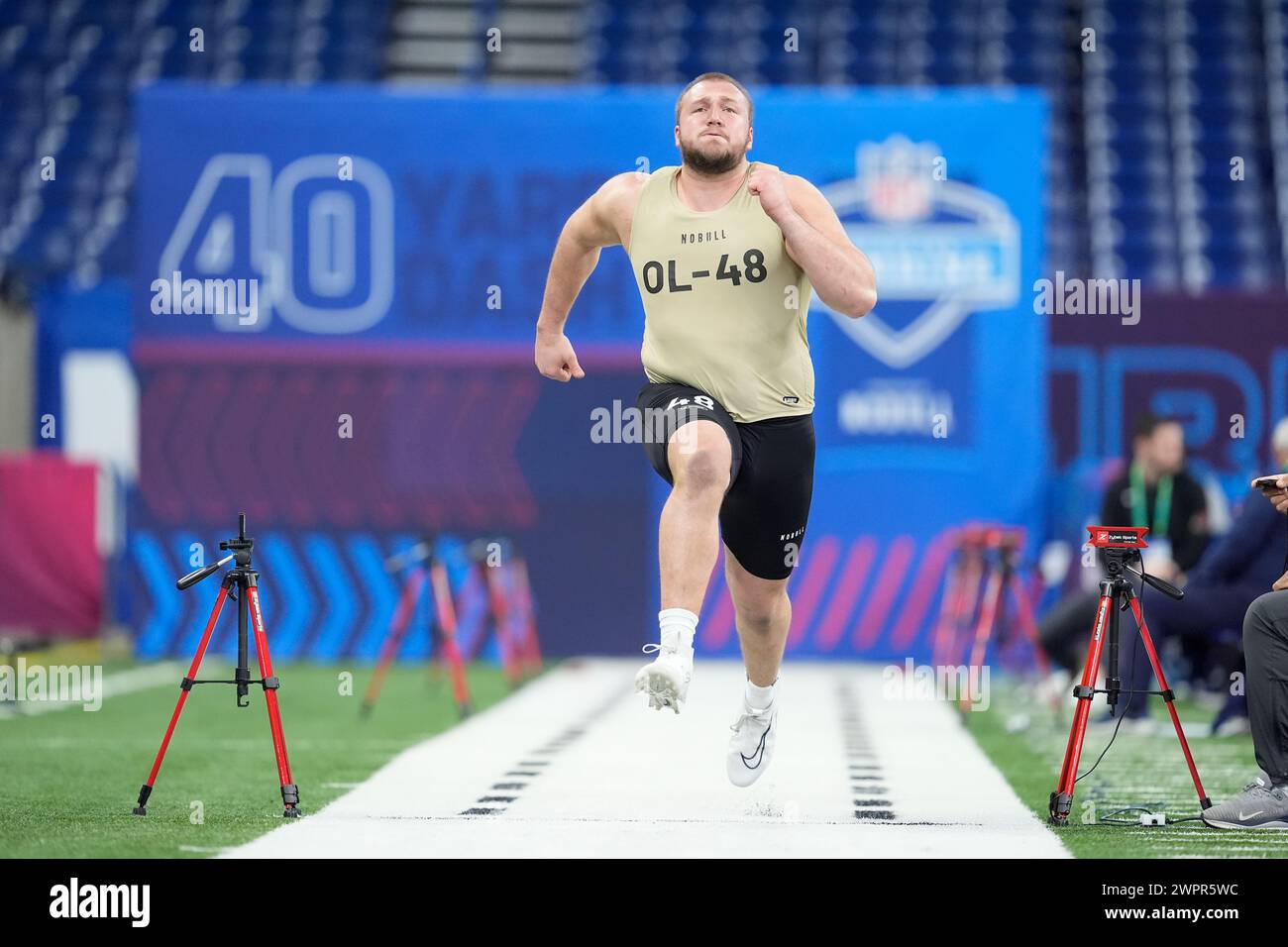 South Dakota State offensive lineman Mason McCormick runs a drill at ...