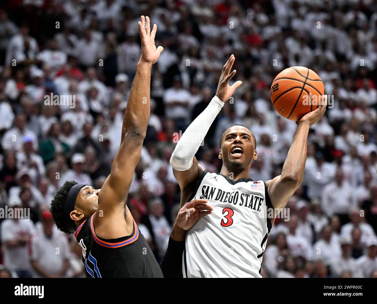 San Diego State guard Micah Parrish (3) shoots against Boise State guard Chibuzo Agbo during the ...