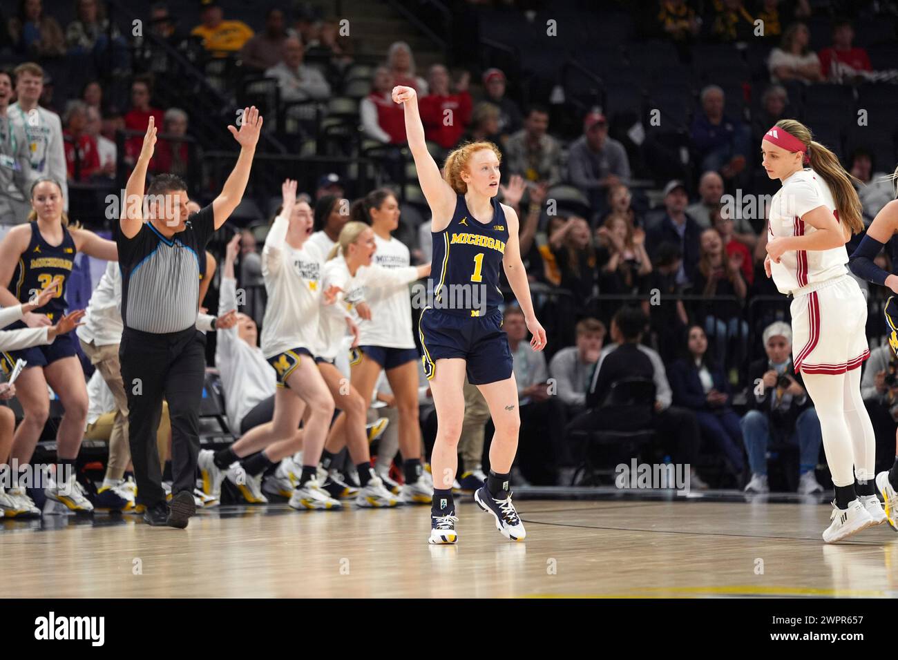 Michigan guard Lauren Hansen (1) celebrates after making a 3-point ...