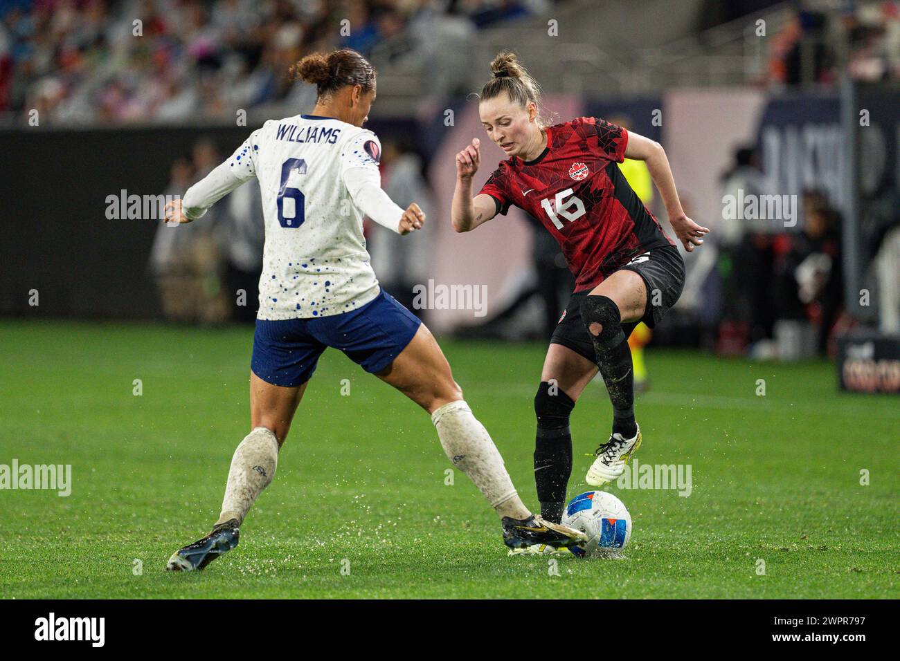 Canada defender Gabrielle Carle (16) is defended by United States ...