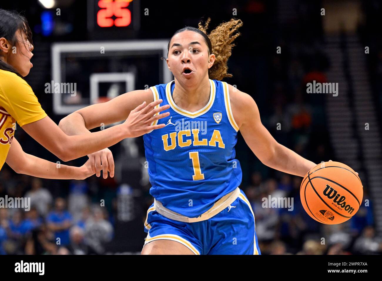 UCLA guard Kiki Rice (1) drives against Southern California during the ...