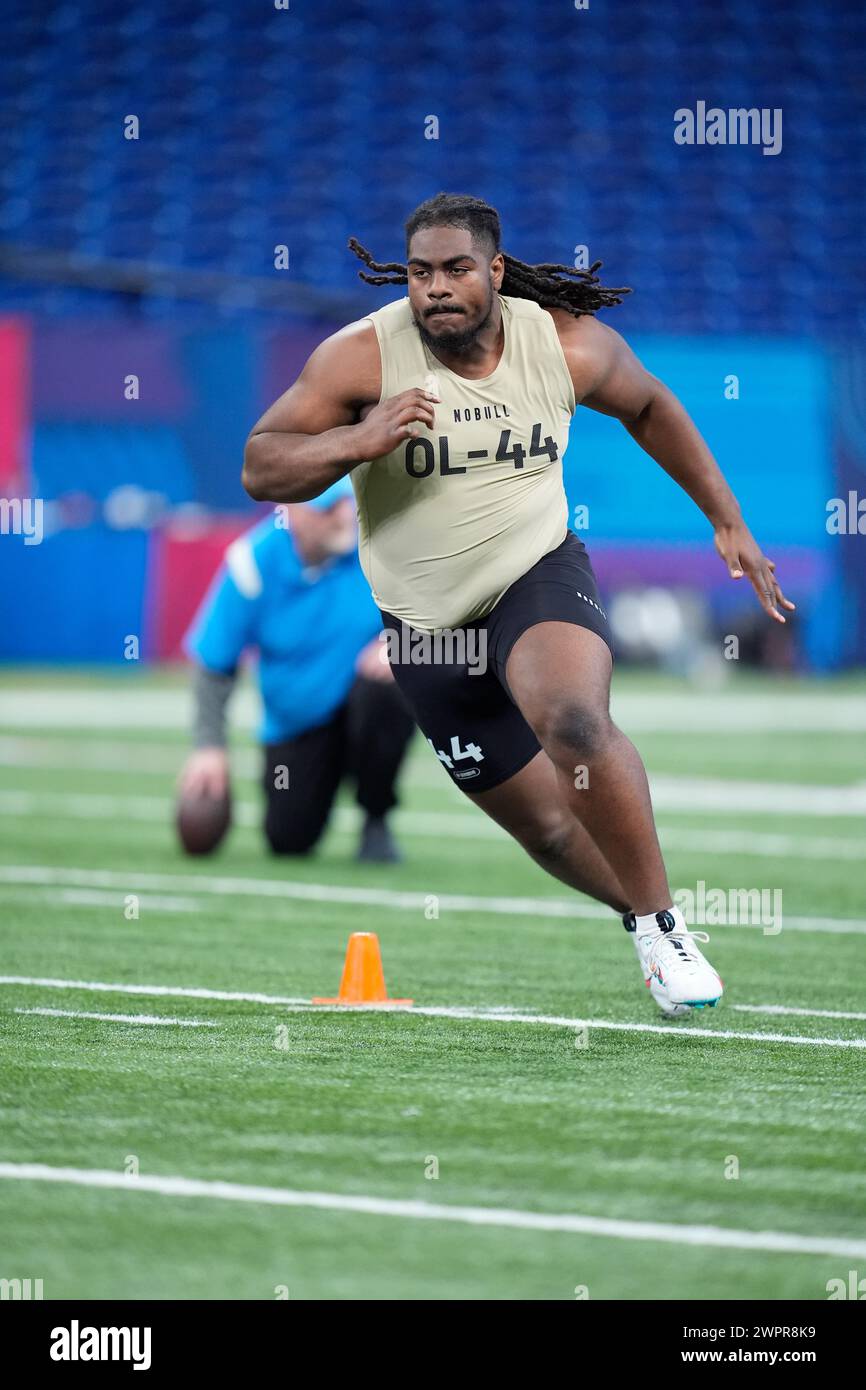 Kansas State offensive lineman KT Leveston runs a drill at the NFL ...