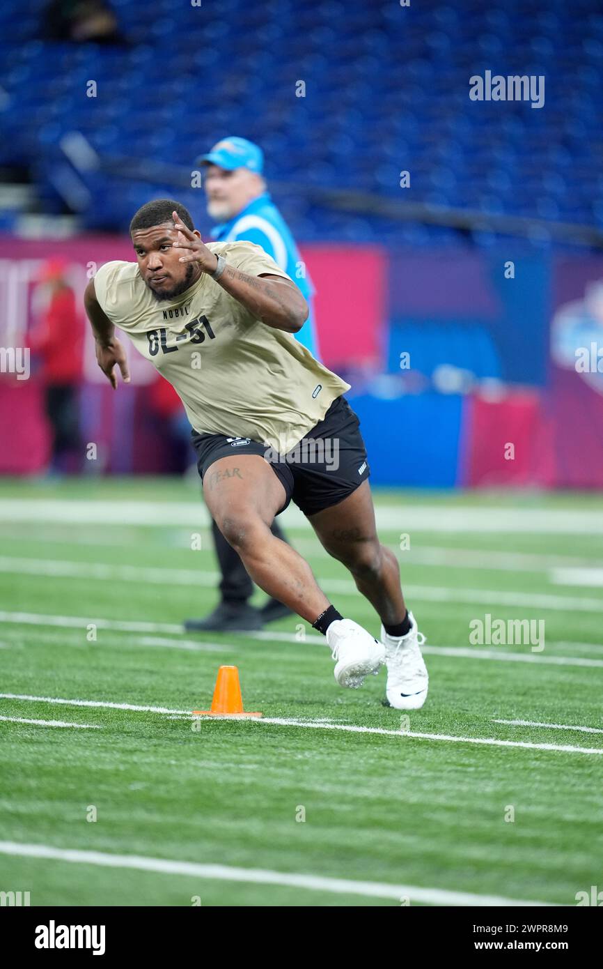 Duke offensive lineman Jacob Monk runs a drill at the NFL football scouting combine, Sunday ...