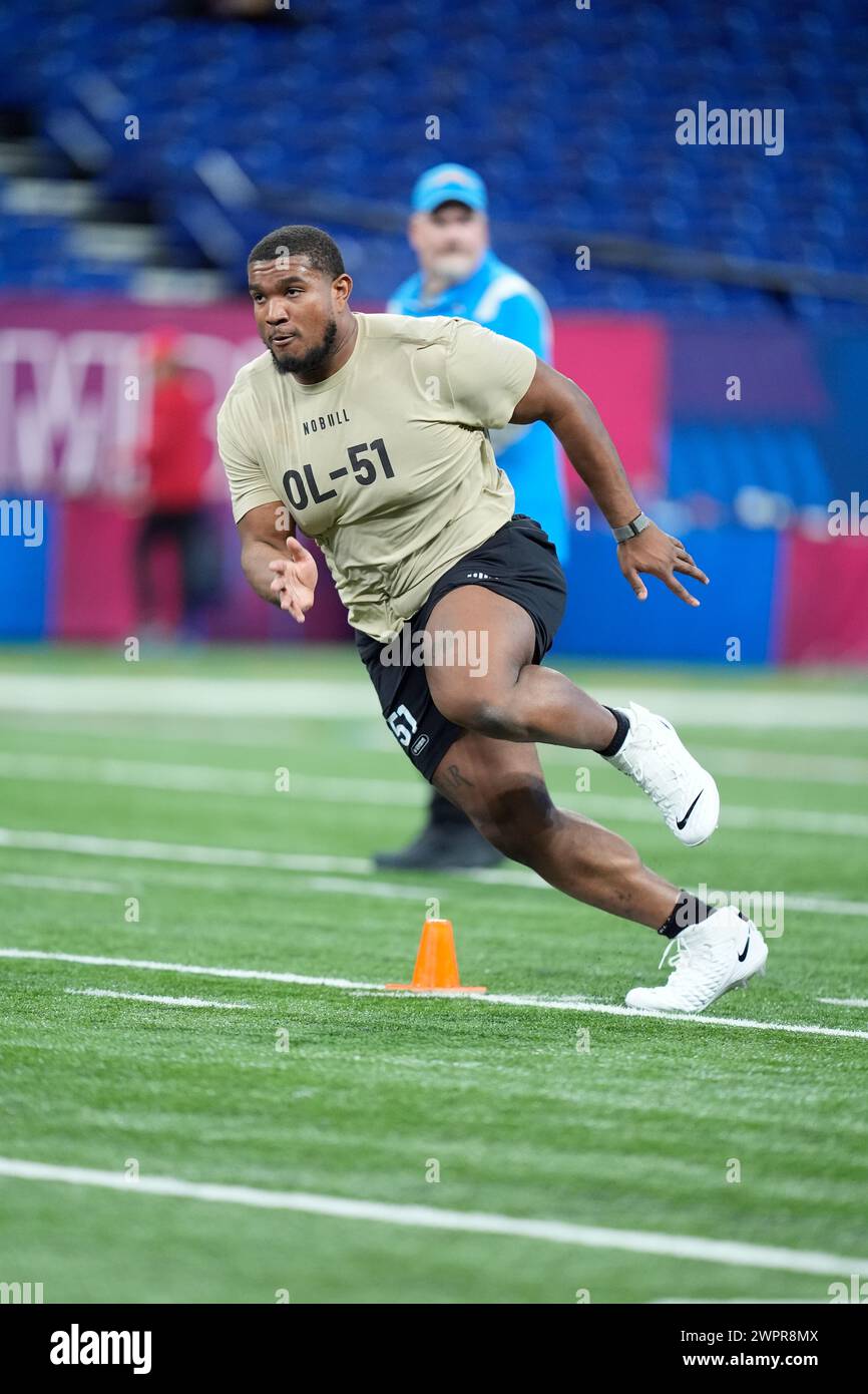 Duke offensive lineman Jacob Monk runs a drill at the NFL football scouting combine, Sunday ...
