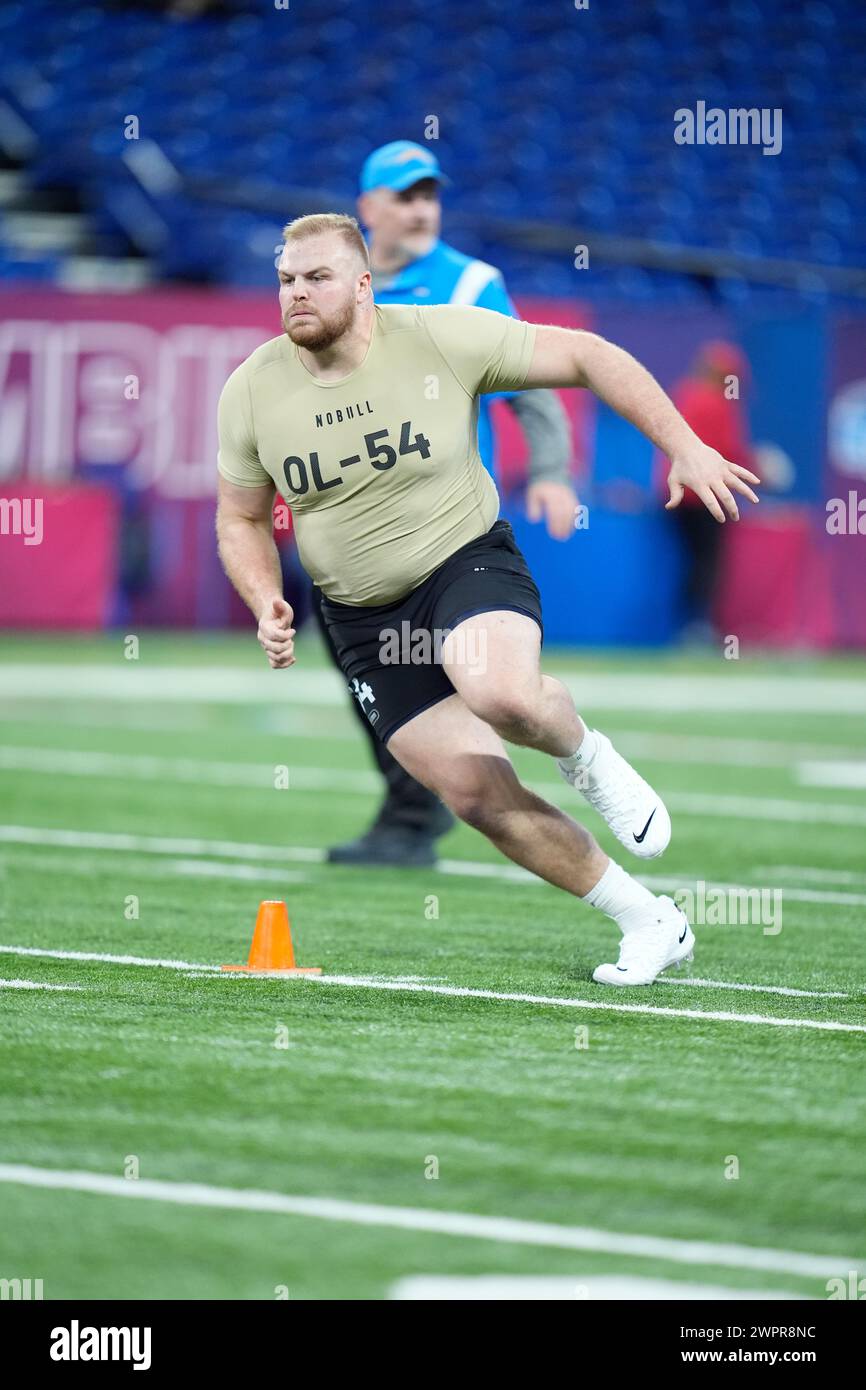 Michigan offensive lineman Drake Nugent runs a drill at the NFL ...