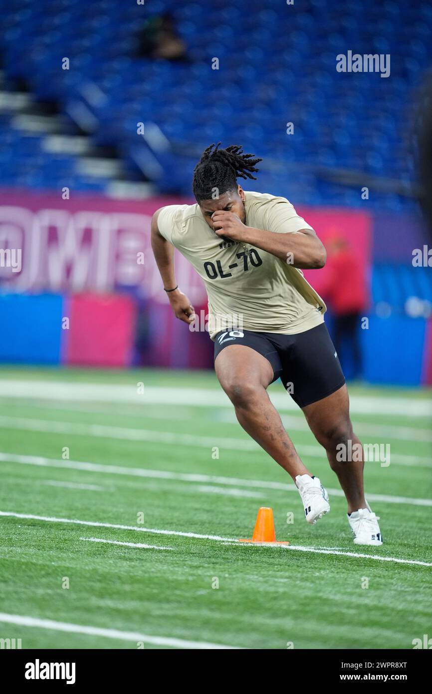Penn State offensive lineman Caedan Wallace runs a drill at the NFL ...
