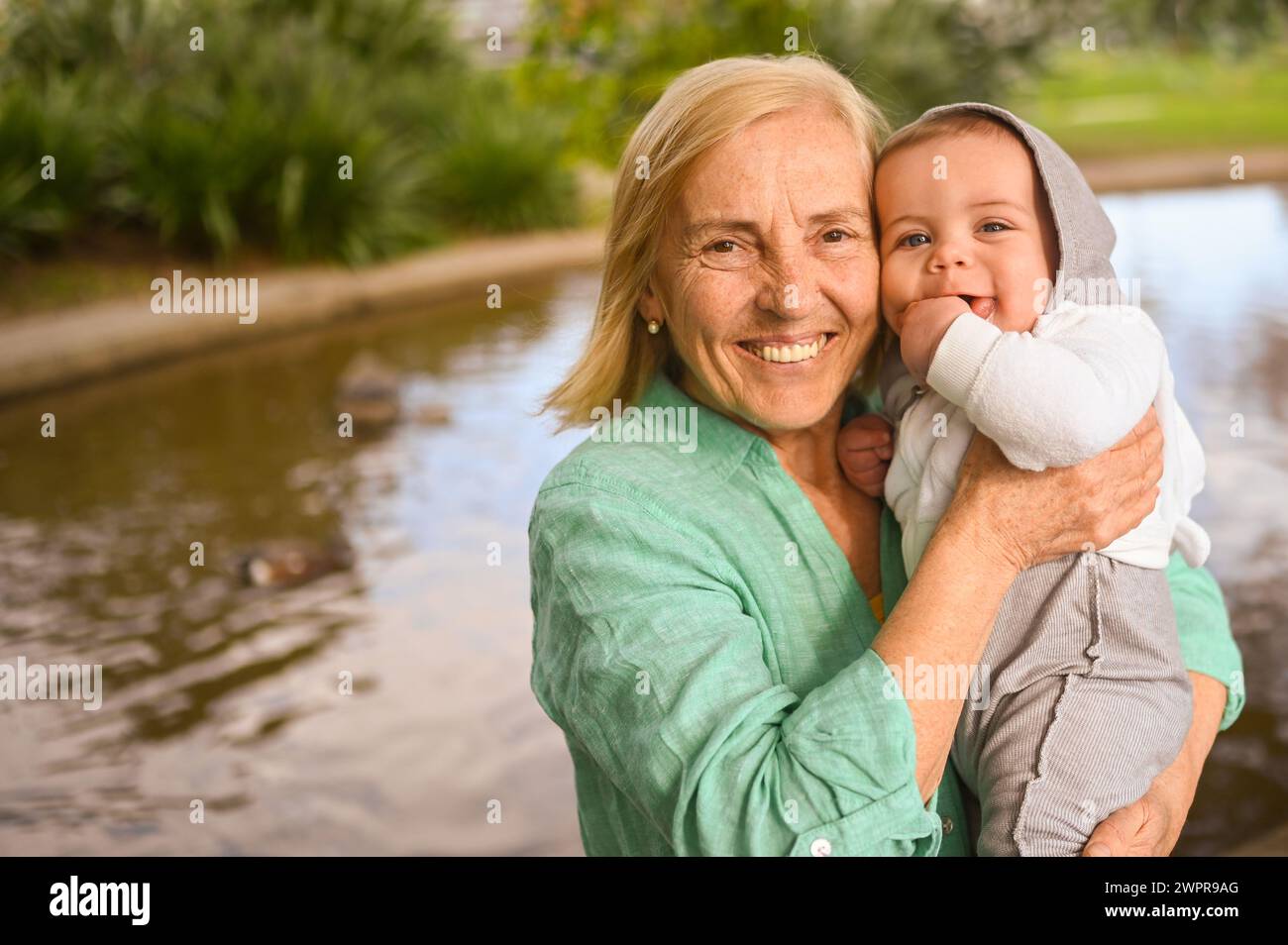 Beautiful happy smiling senior elderly woman holding on hands cute ...