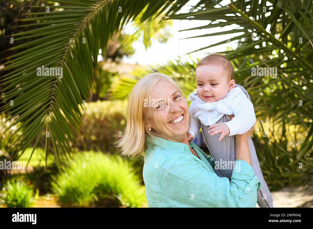 Beautiful happy smiling senior elderly woman holding on hands cute ...