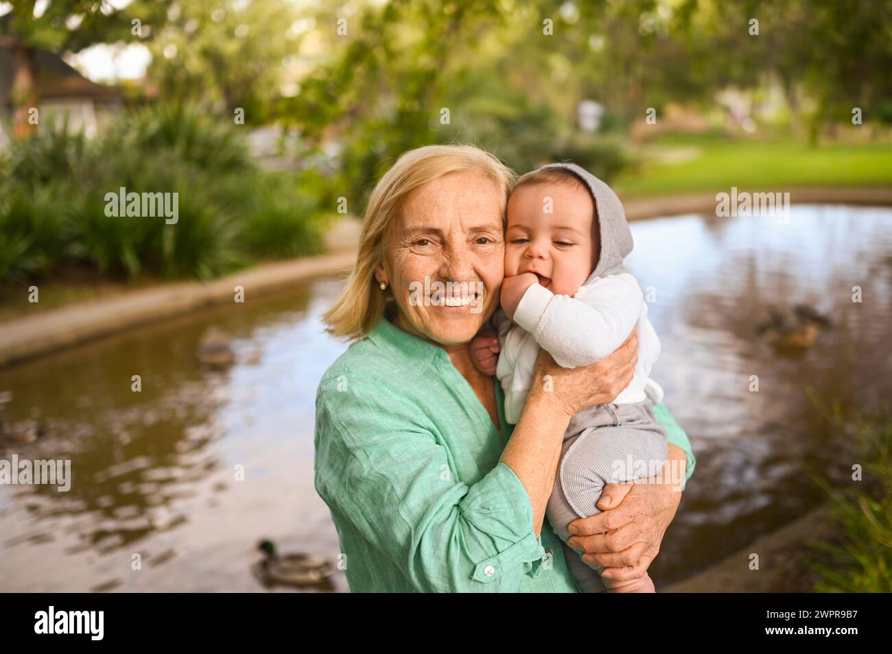 Beautiful happy smiling senior elderly woman holding on hands cute ...