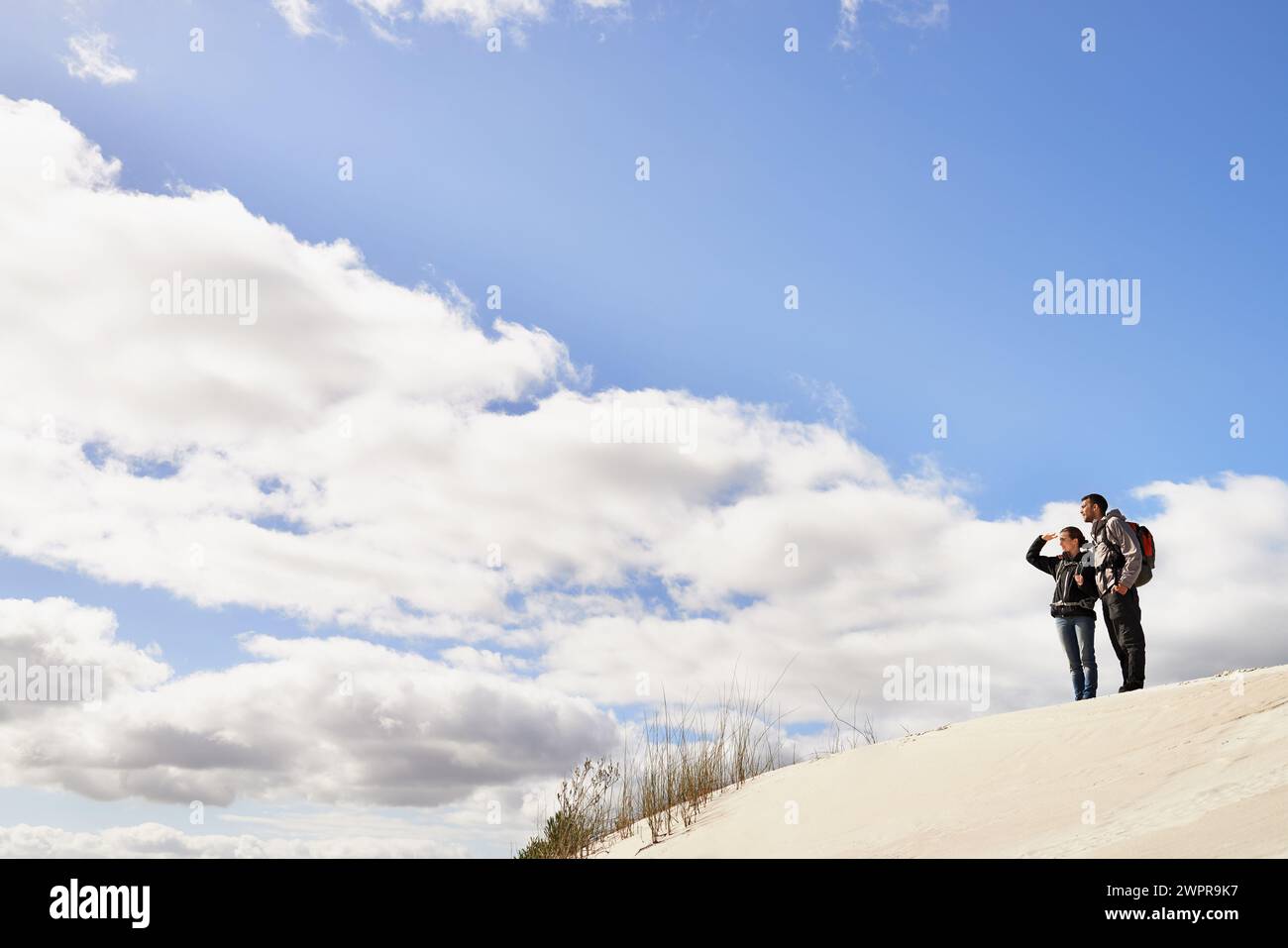 Travel, love and couple in desert for location search, view or scenery ...