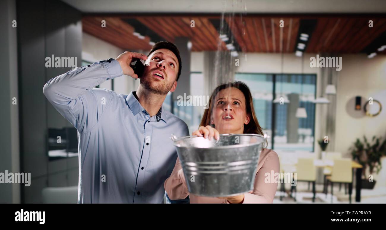 Emergency Leak Damage Water Leak Or Flood From Ceiling Stock Photo - Alamy