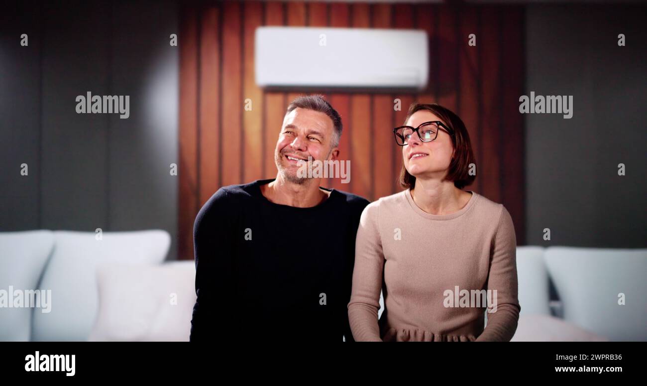 Family using air conditioning hi-res stock photography and images - Alamy