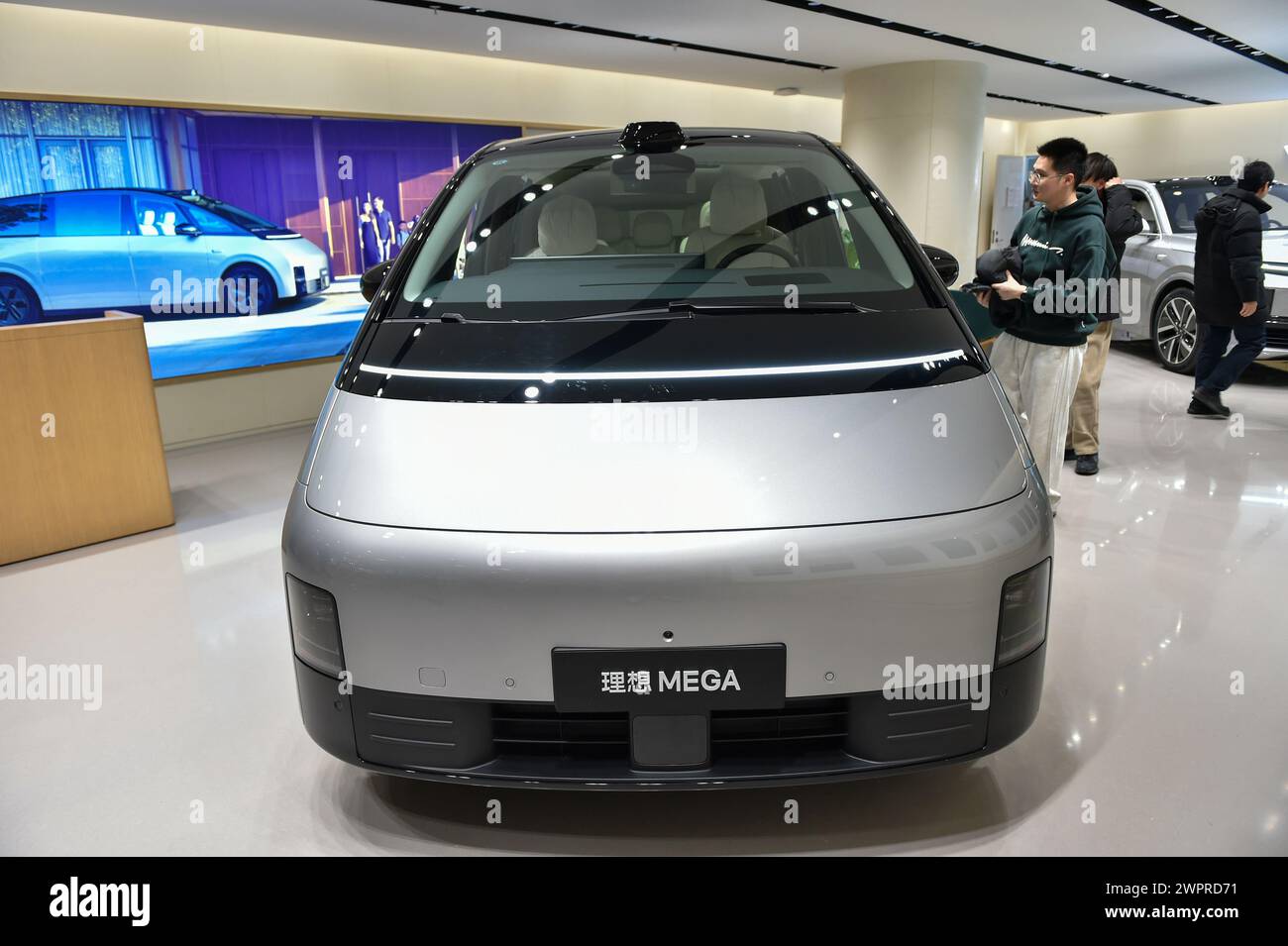NANJING, CHINA - MARCH 9, 2024 - Customers experience the new MPV model ...