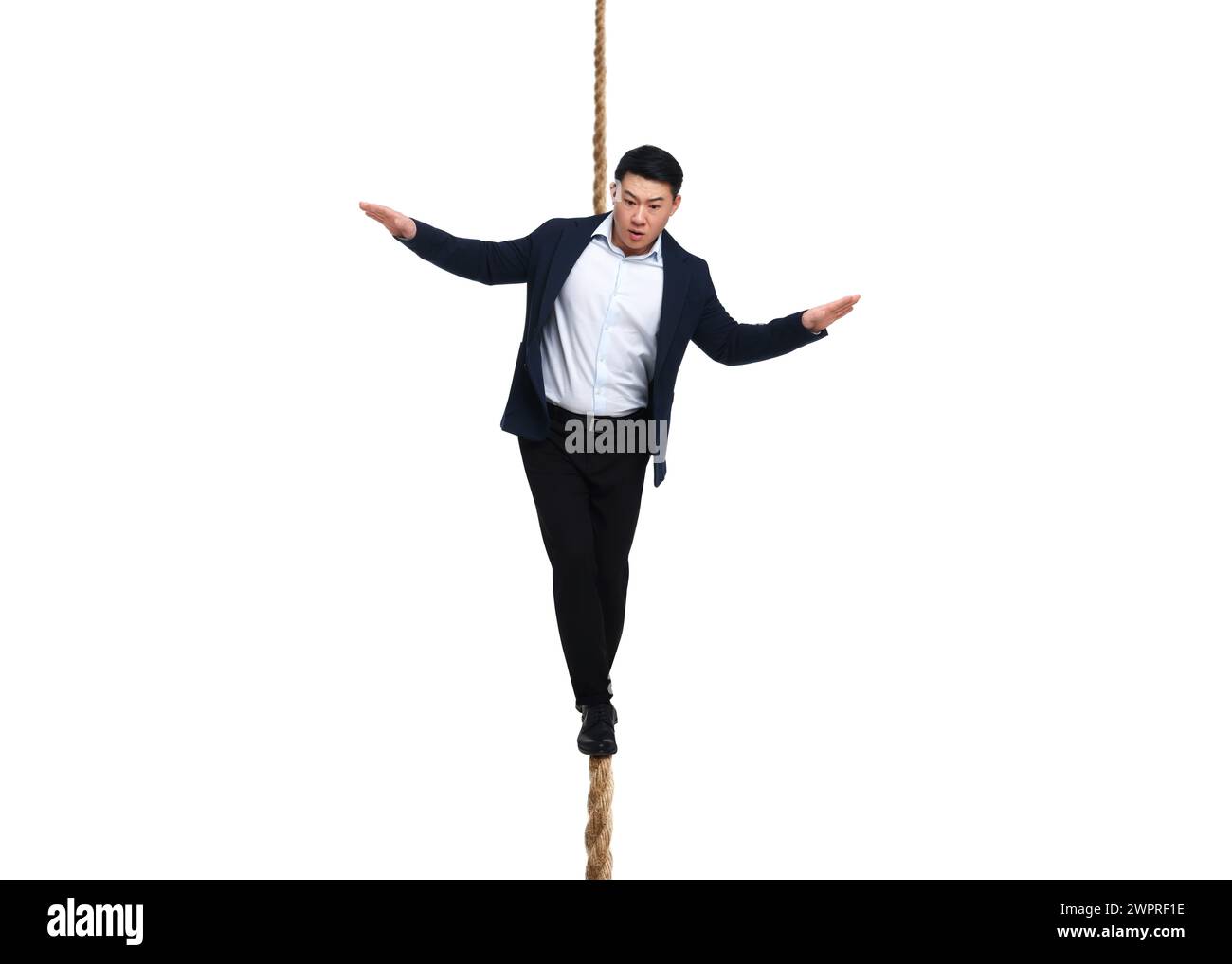 Man balancing on rope hi-res stock photography and images - Alamy