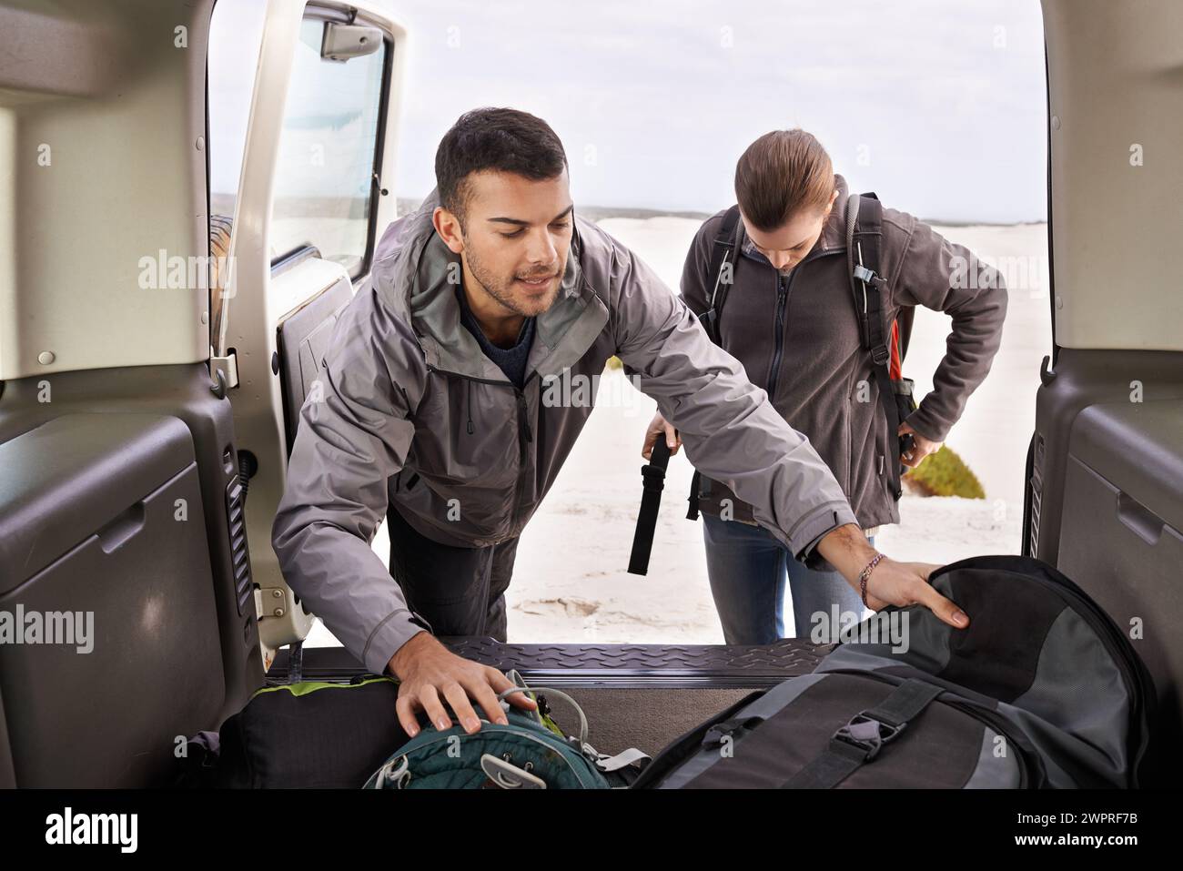Car, man and woman outdoors for backpacking on vacation for adventure ...