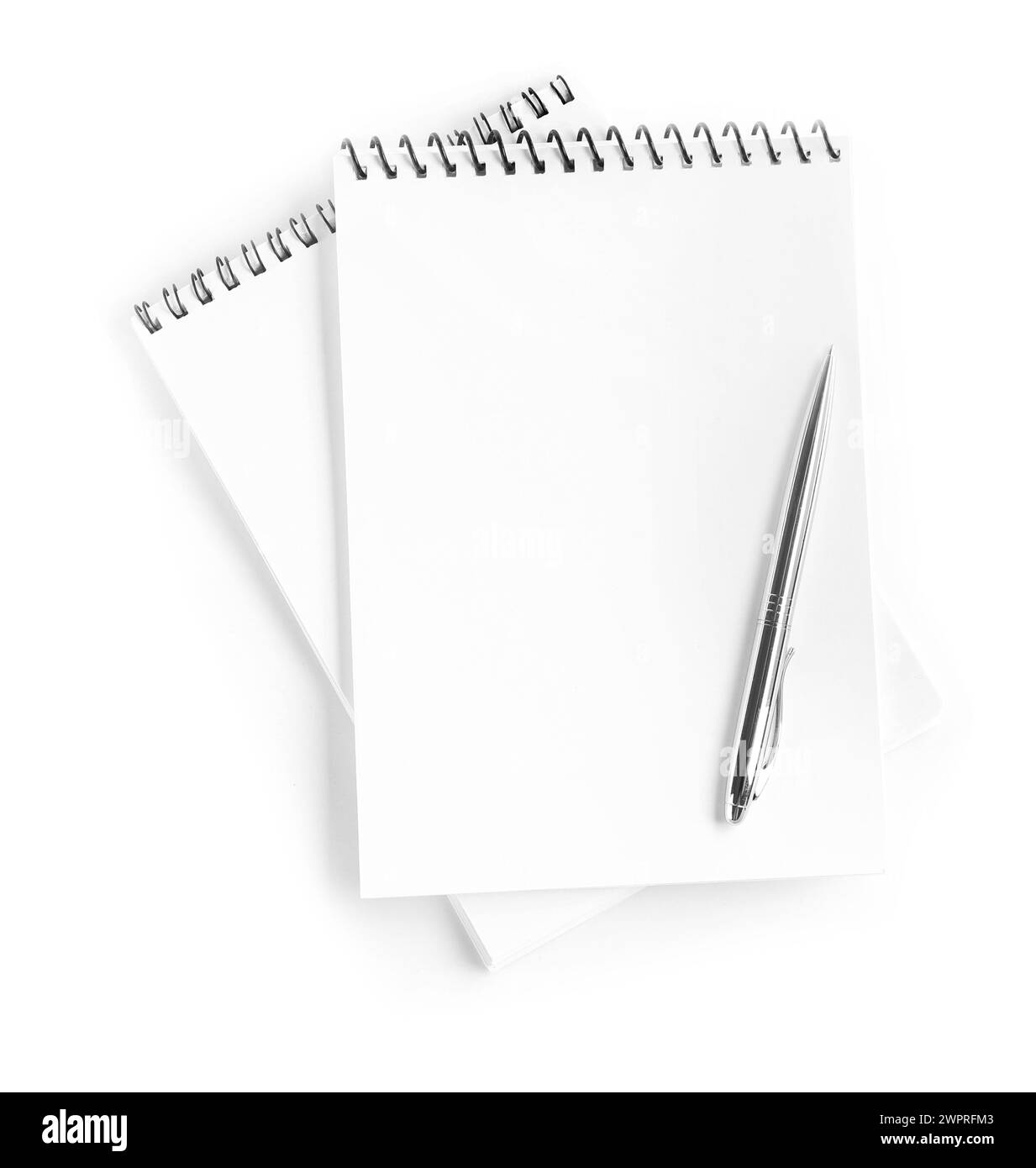 Two notebooks and pen isolated on white, top view Stock Photo - Alamy