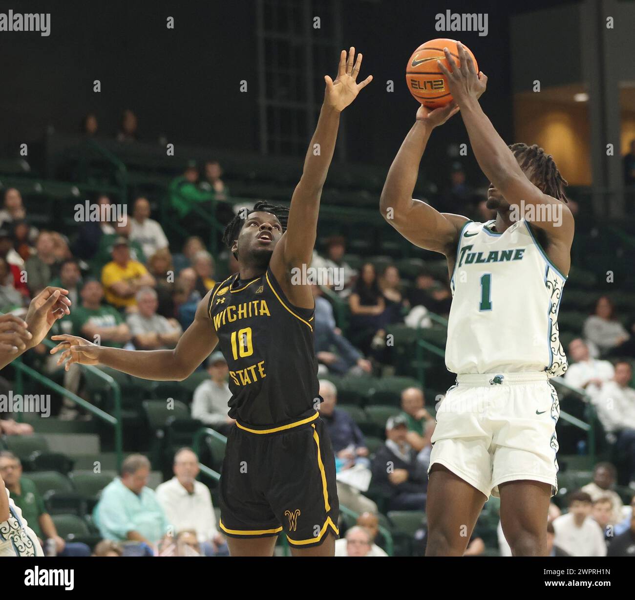 Tulane Green Wave guard Sion James (1) shoots a jumper against Wichita ...