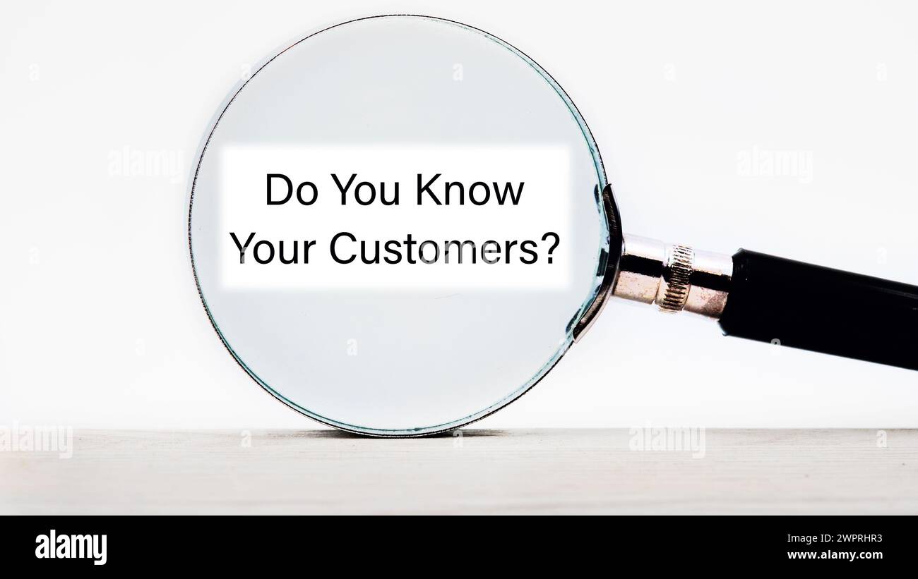 Do You Know Your Customer text through a magnifying glass Stock Photo ...