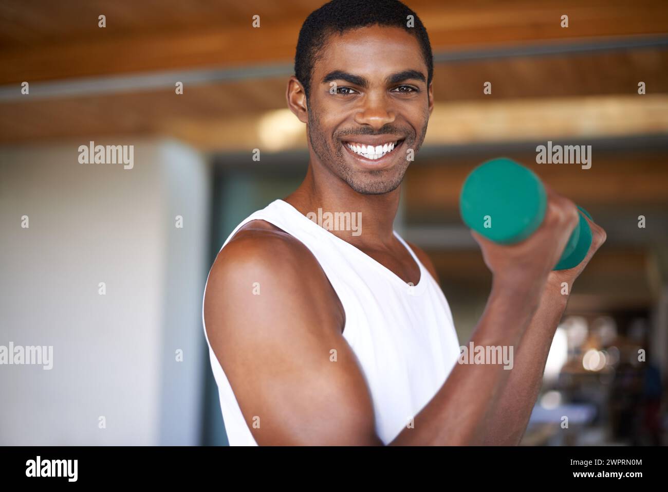 Black man, smile and training with dumbbell for exercise, bodybuilding ...