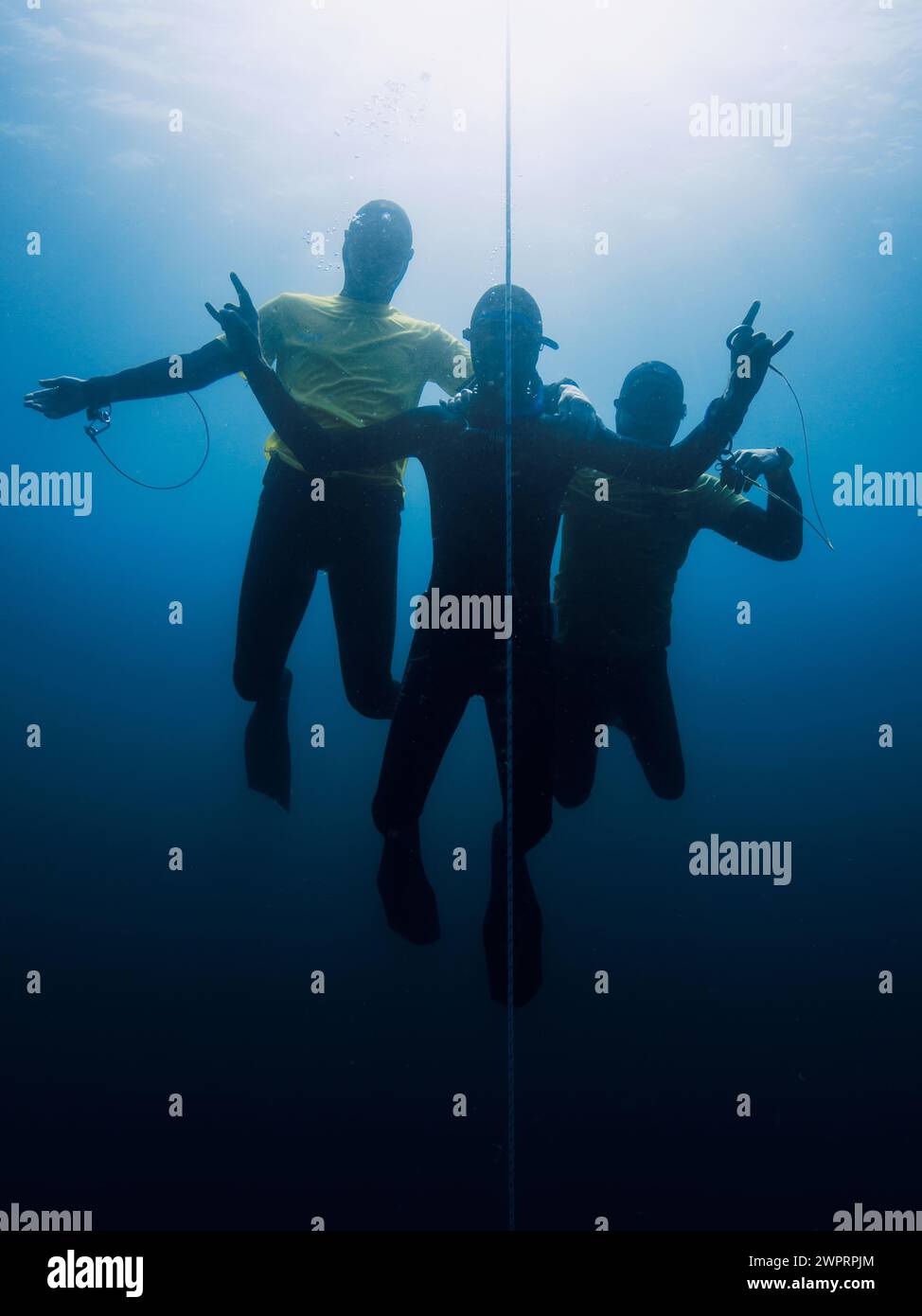 March 04, 2024. Nusa Penida, Indonesia. Group of freedivers in wetsuit ...
