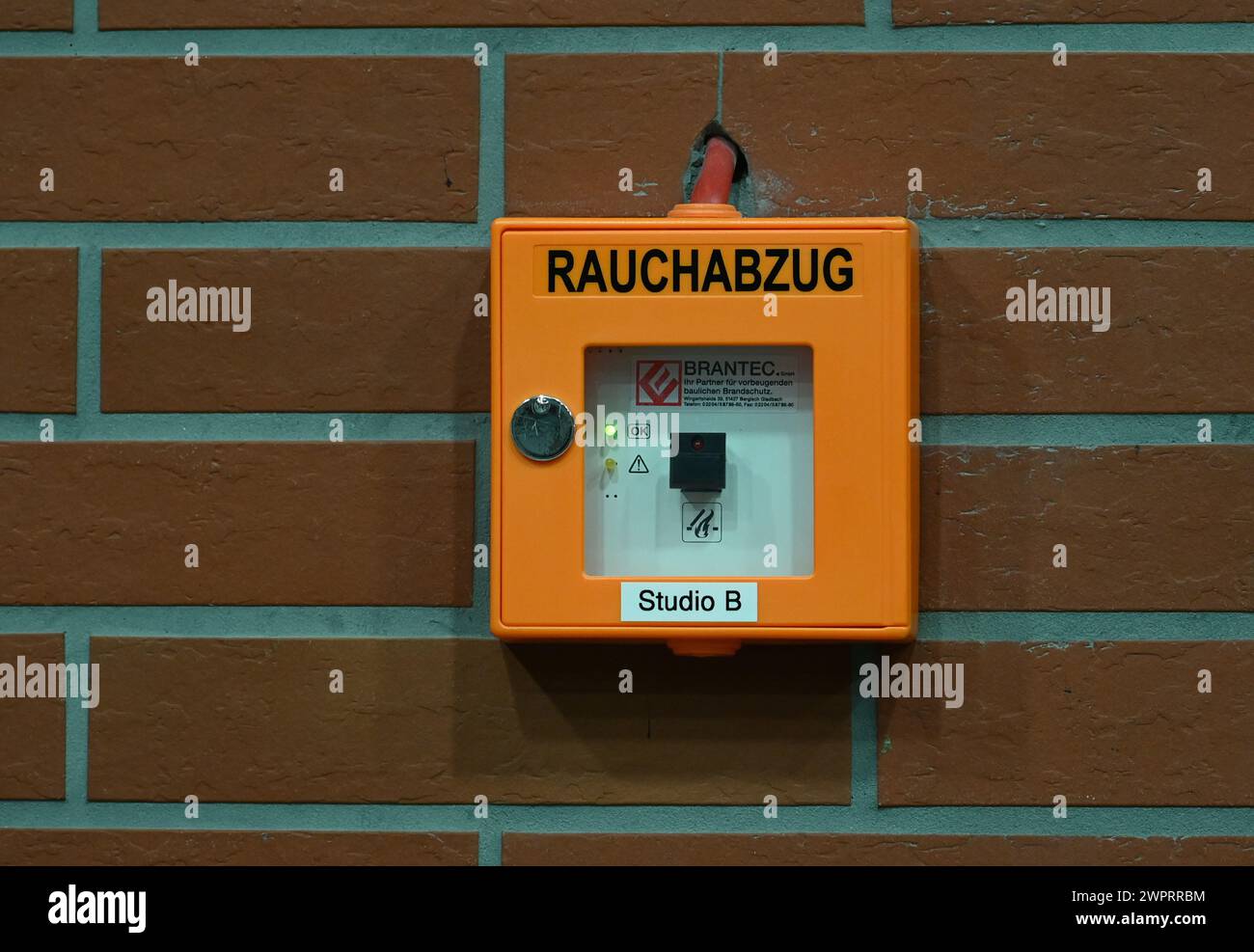 Cologne, Germany. 07th Mar, 2024. A box labeled smoke vent hangs on the ...