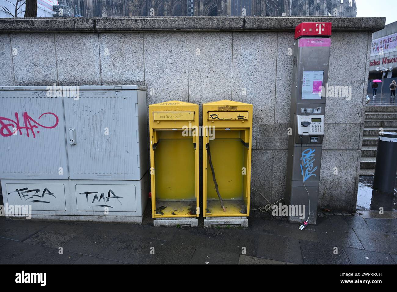Cologne, Germany. 05th Mar, 2024. Deutsche Post public mailboxes and a ...