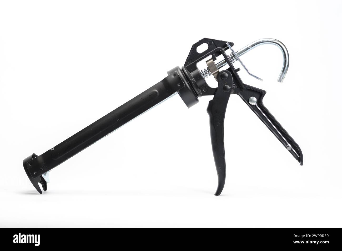 Silicone gun on white background Stock Photo - Alamy