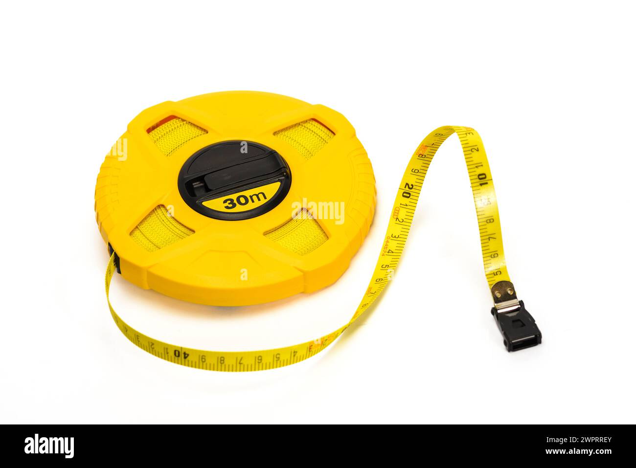 Thirty meter yellow flexible measuring tape on white background Stock ...