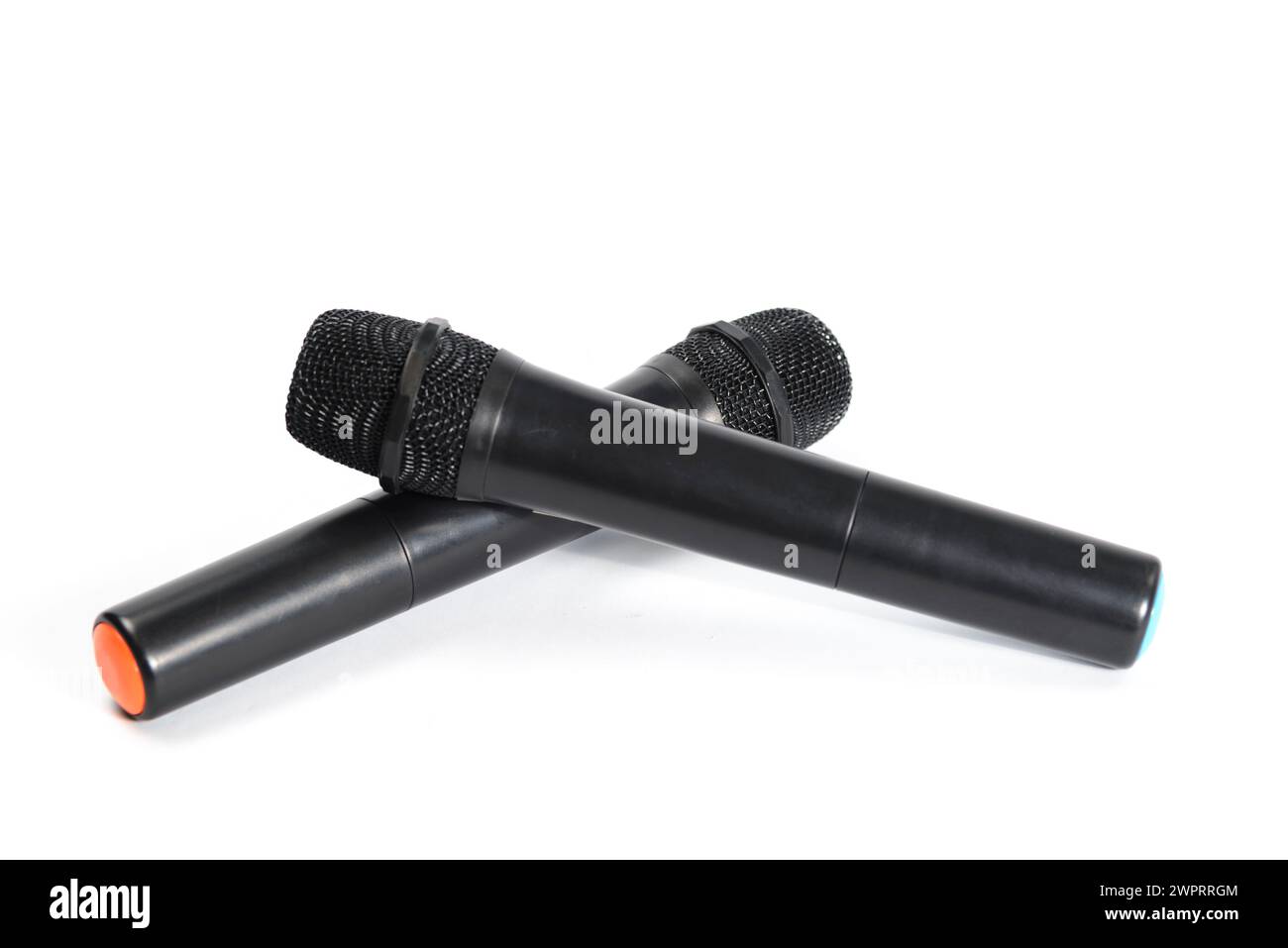 Set of two black wireless condenser microphones on white background ...