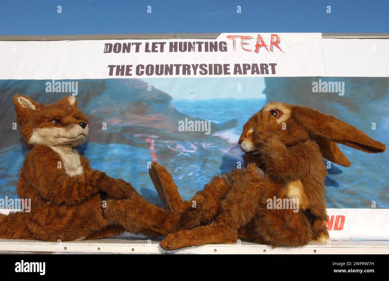 A fox and hare unveil a giant billboard sponsored by the Scottish ...