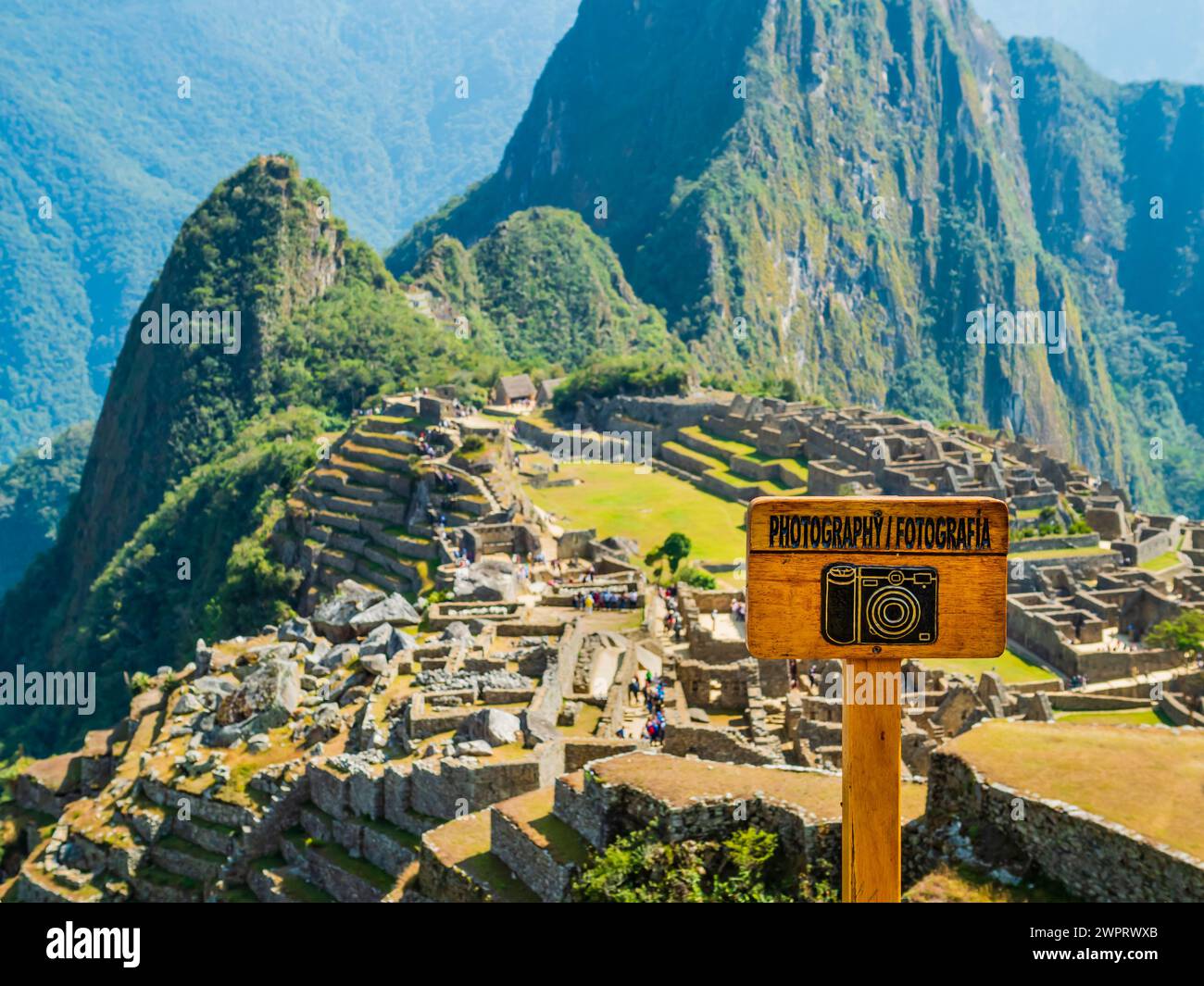 Panoramic viewpoint of the lost Inca city Machu Picchu, with wooden ...