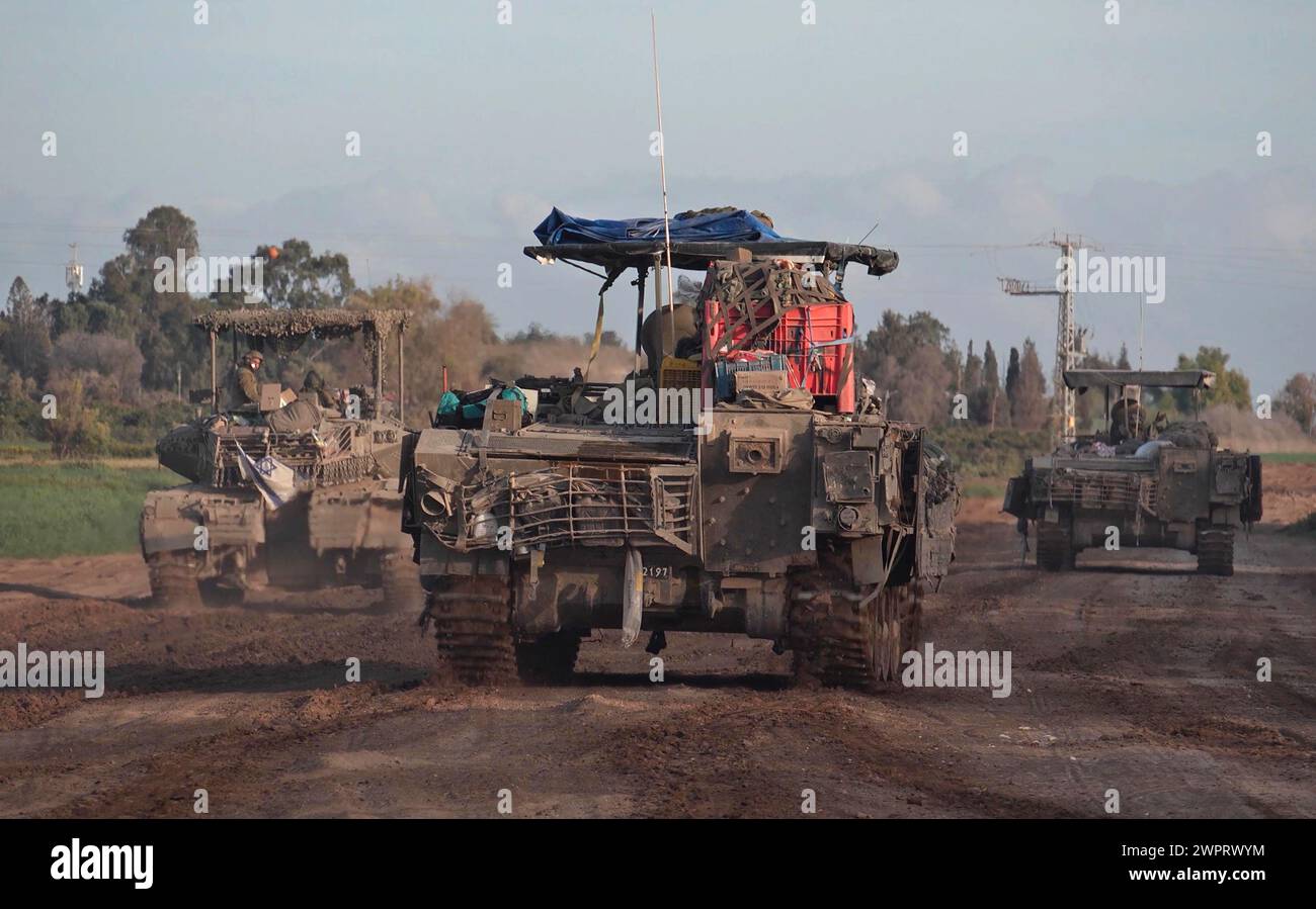 Israeli military armored vehicles return from central Gaza amid ...